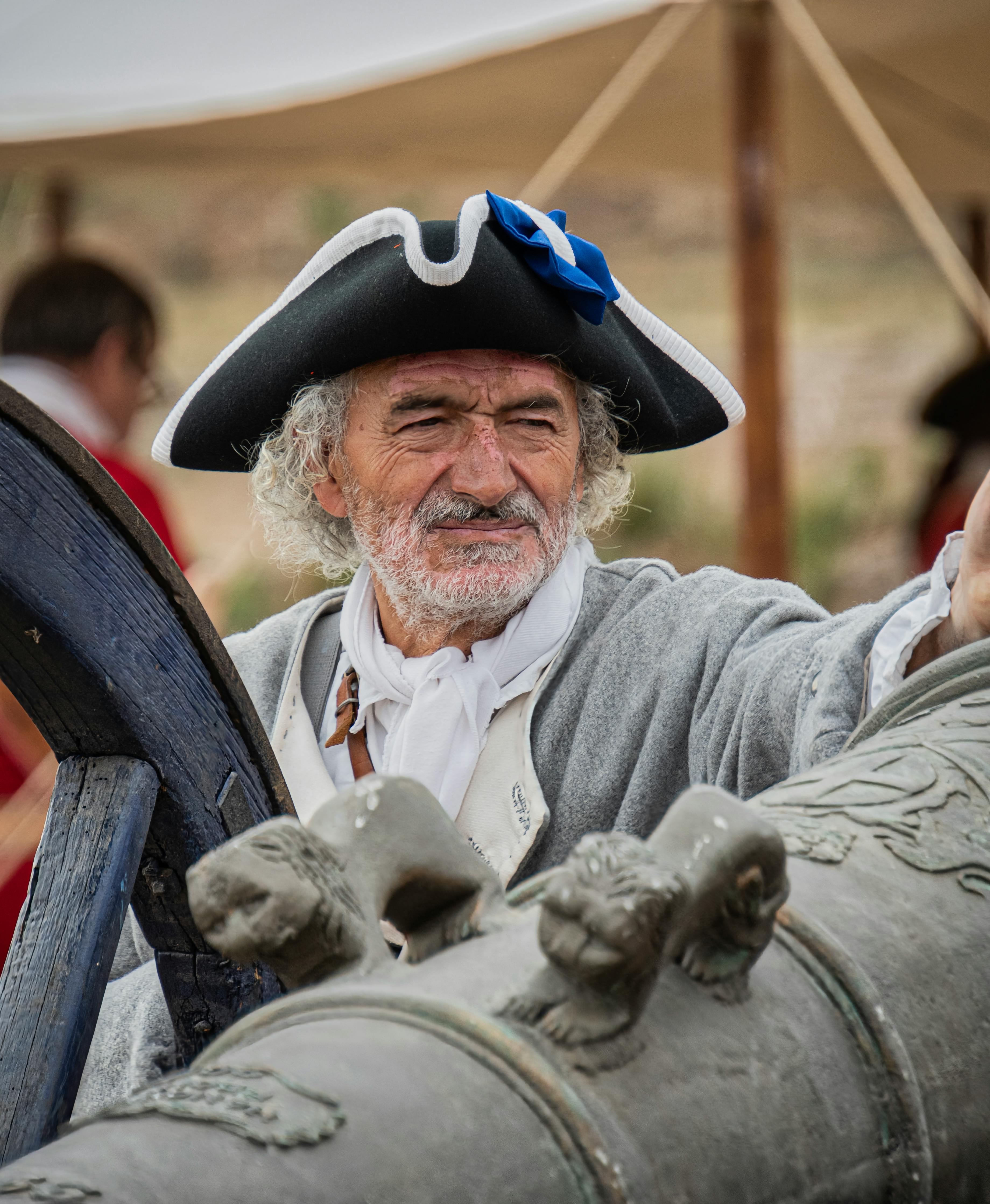 Man in Uniform Posing with Musket · Free Stock Photo