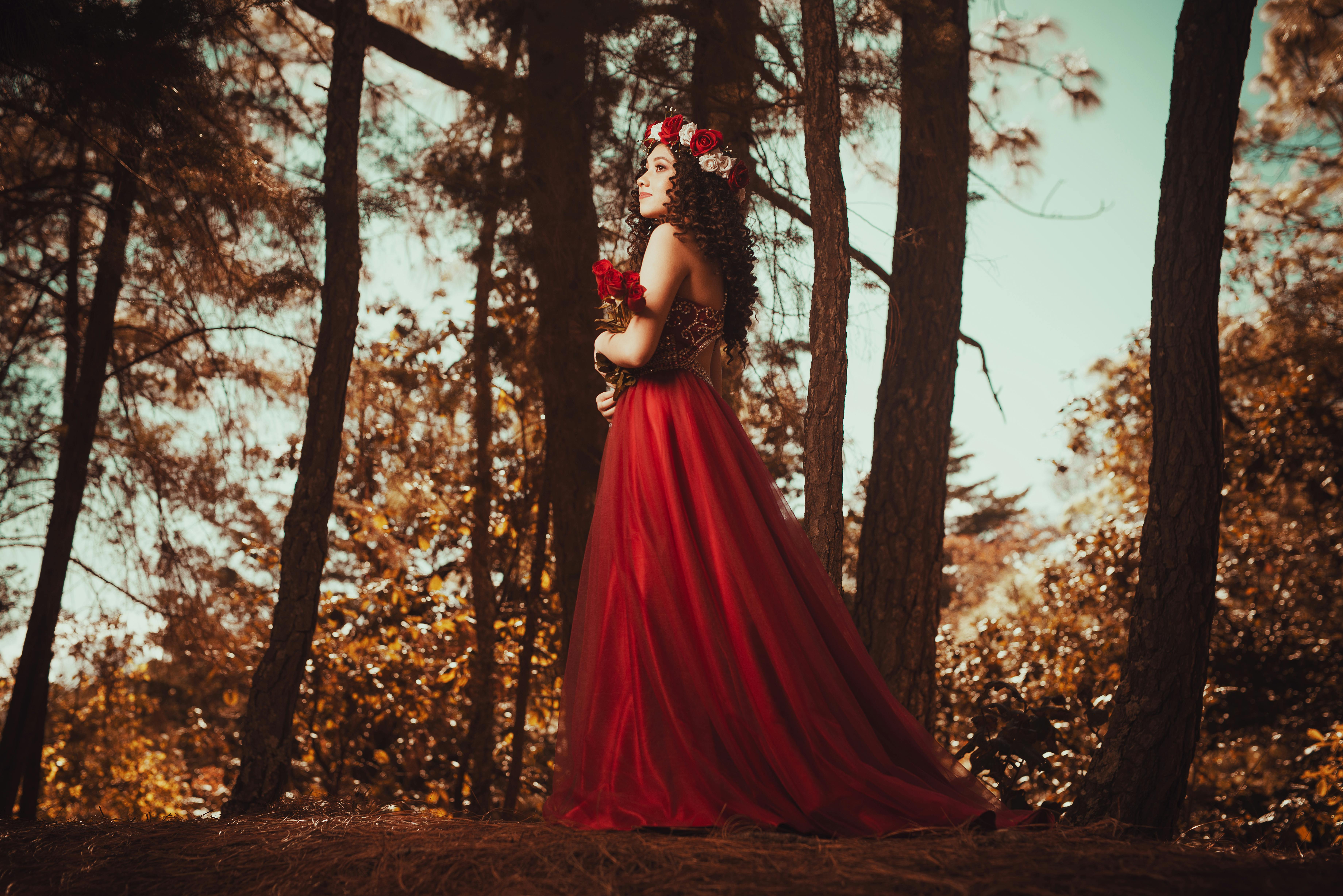 Model Wearing Red Dress in Forest · Free Stock Photo