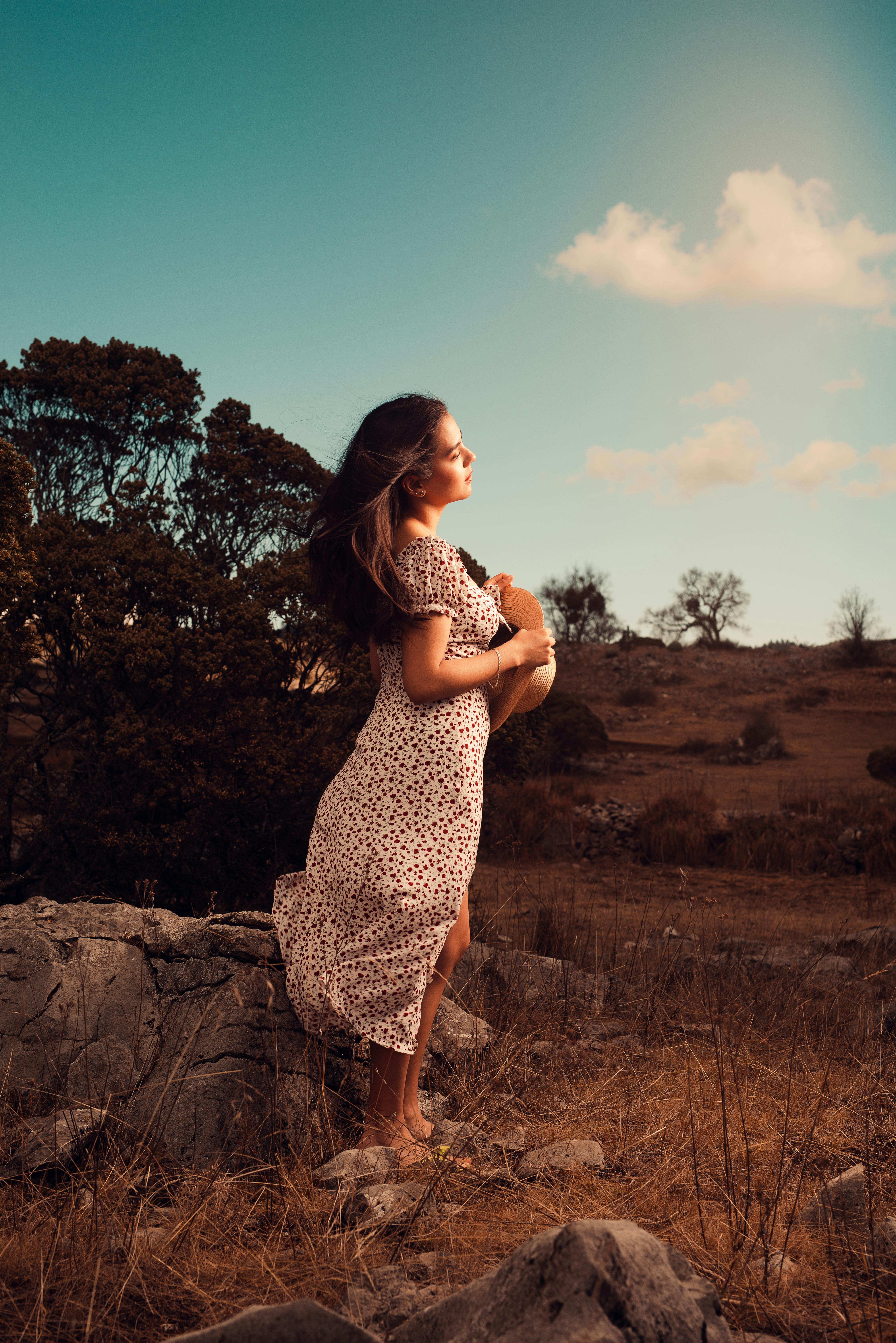Woman Posing on Wind in Summer Dress · Free Stock Photo