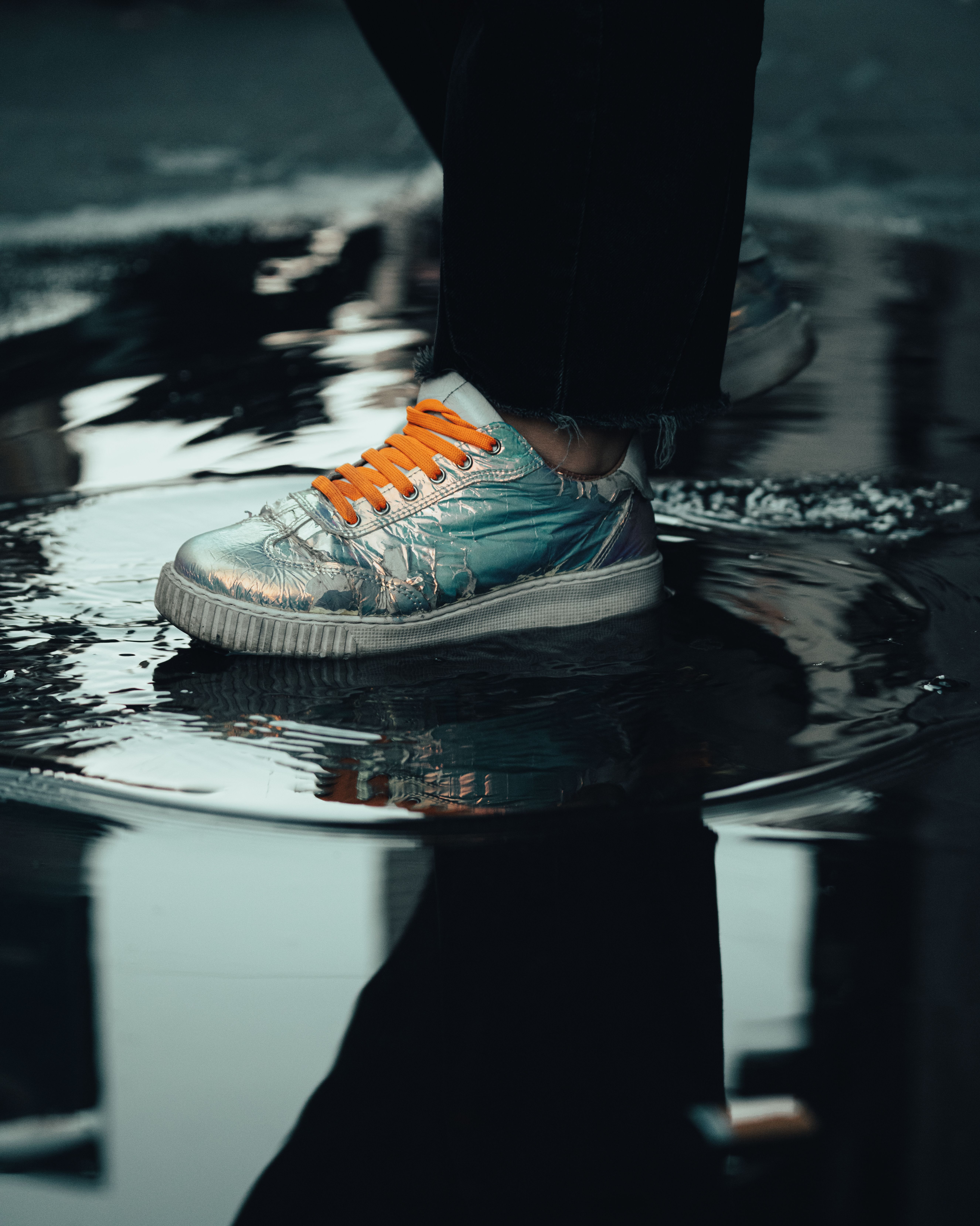 Shoe of Person Standing in Puddle · Free Stock Photo