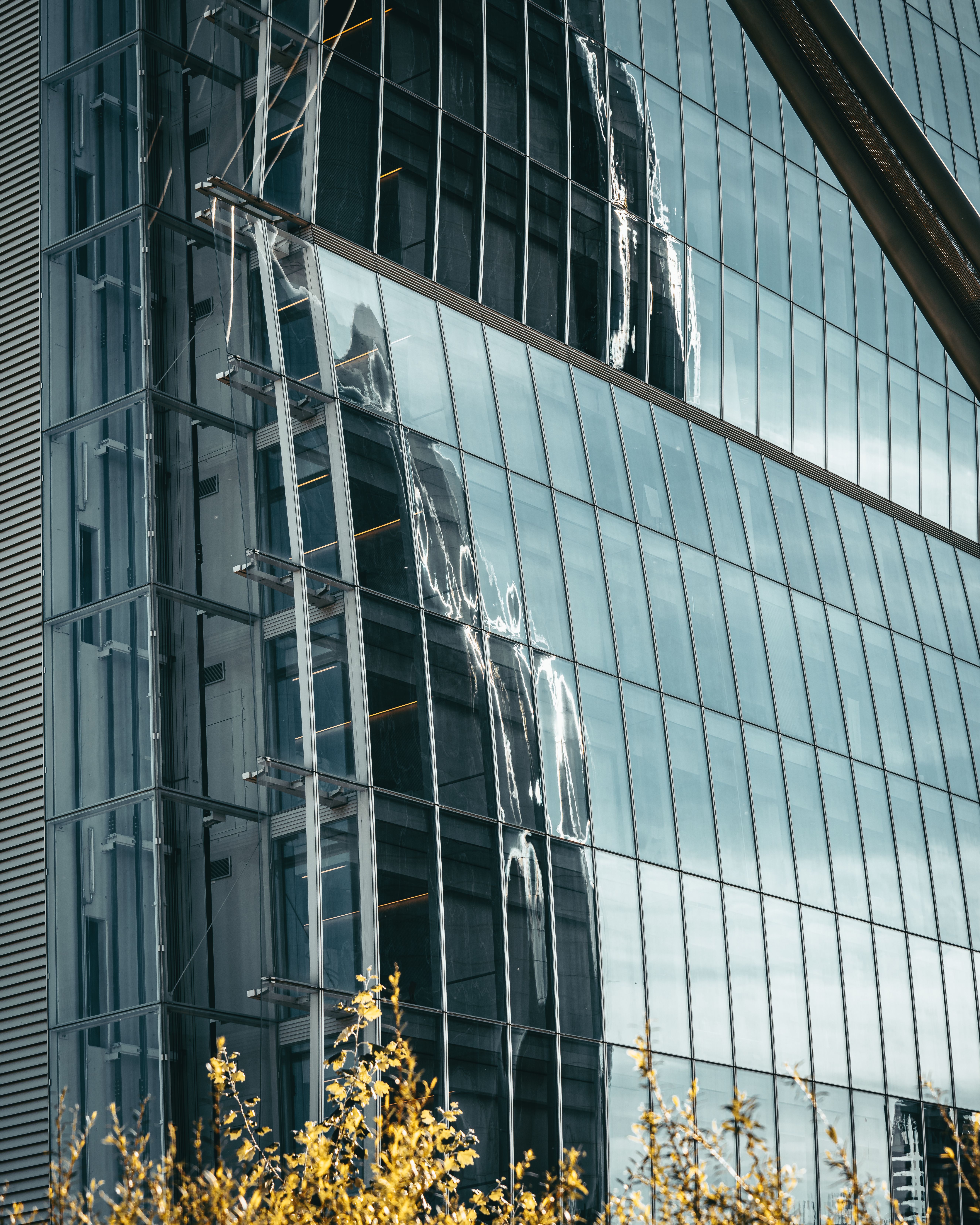 Blue Grey Steel and Glass Skyscraper under Construction · Free Stock Photo