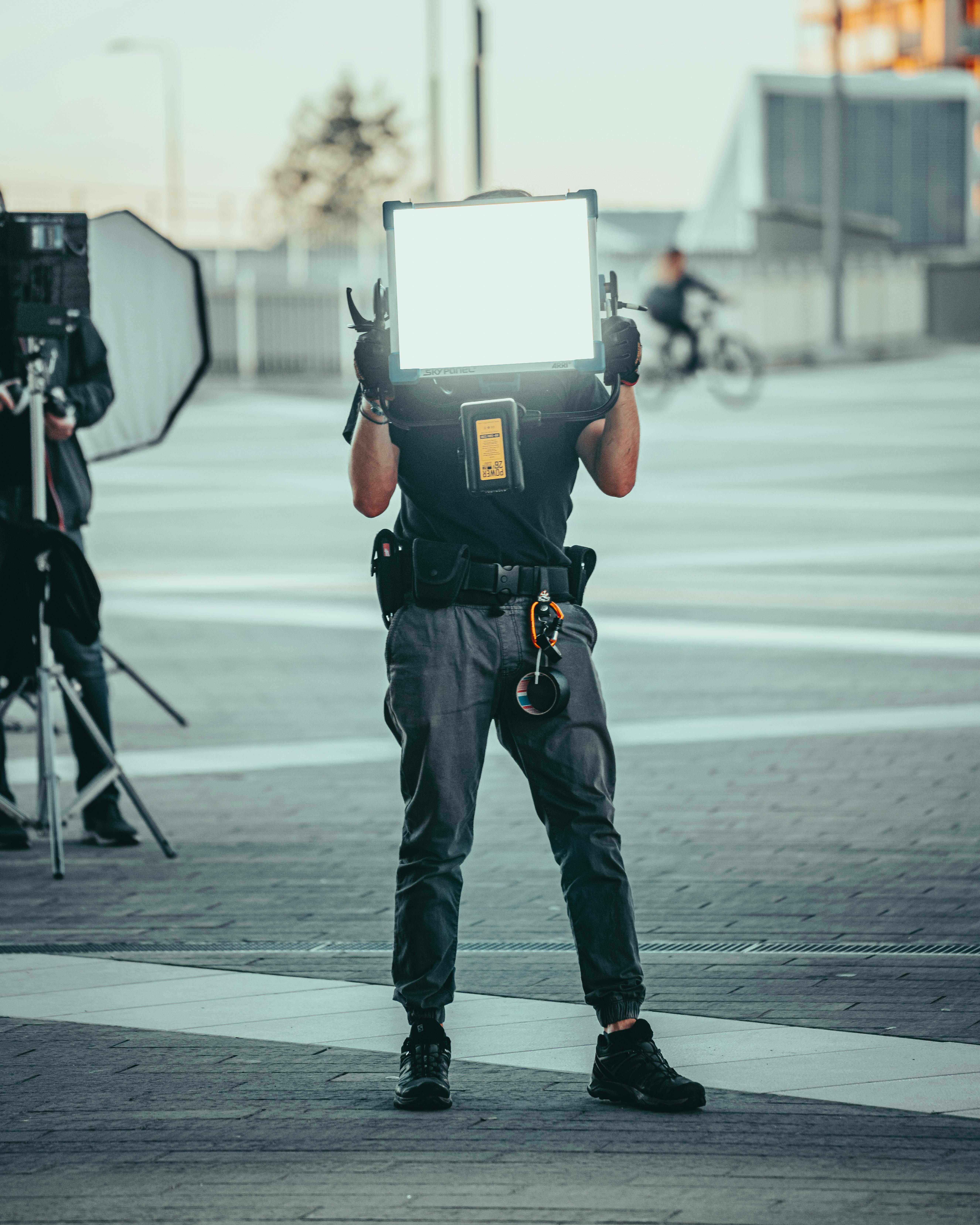 Man Standing with Reflector · Free Stock Photo
