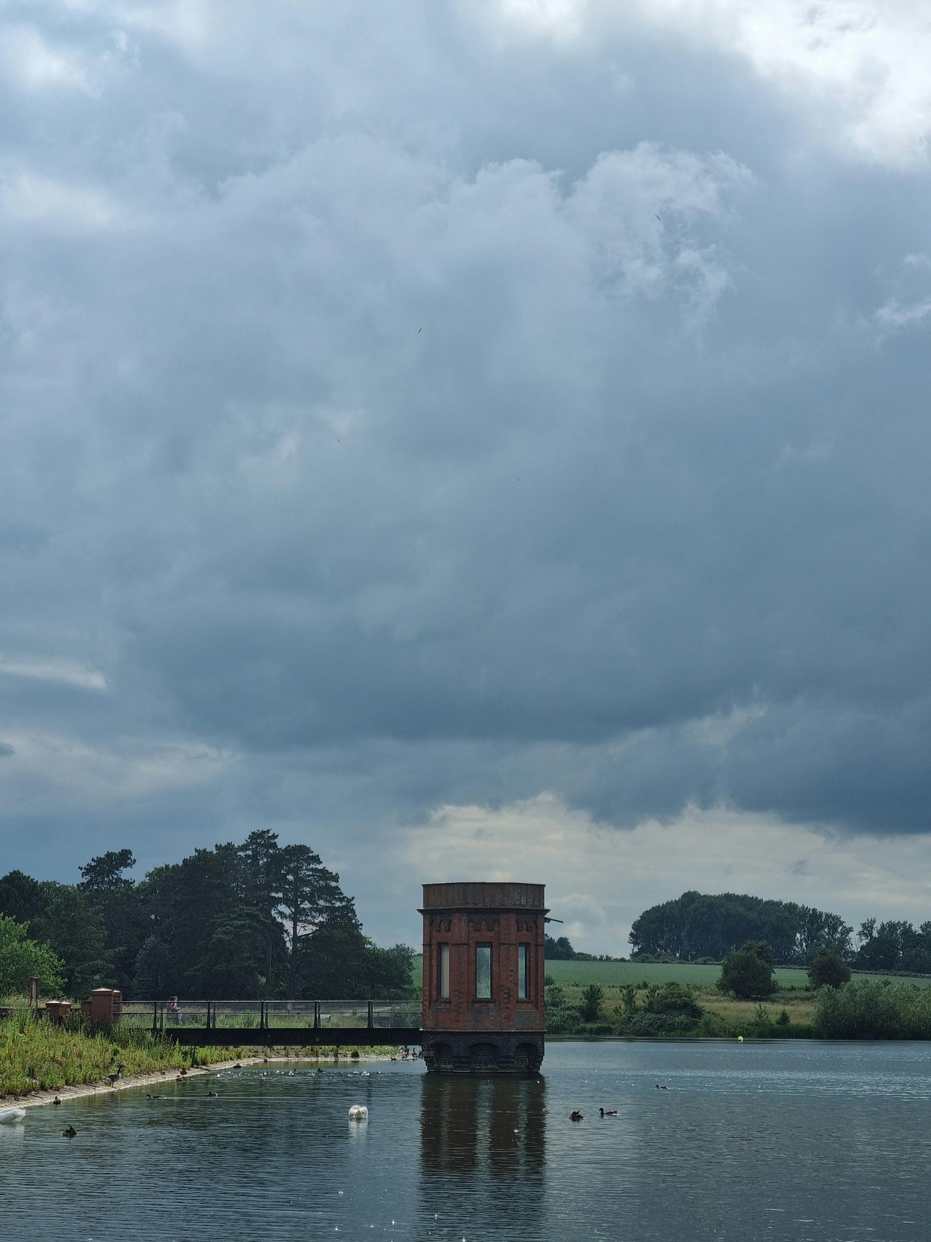 Sywell Reservoir Tower under Rain Clouds · Free Stock Photo