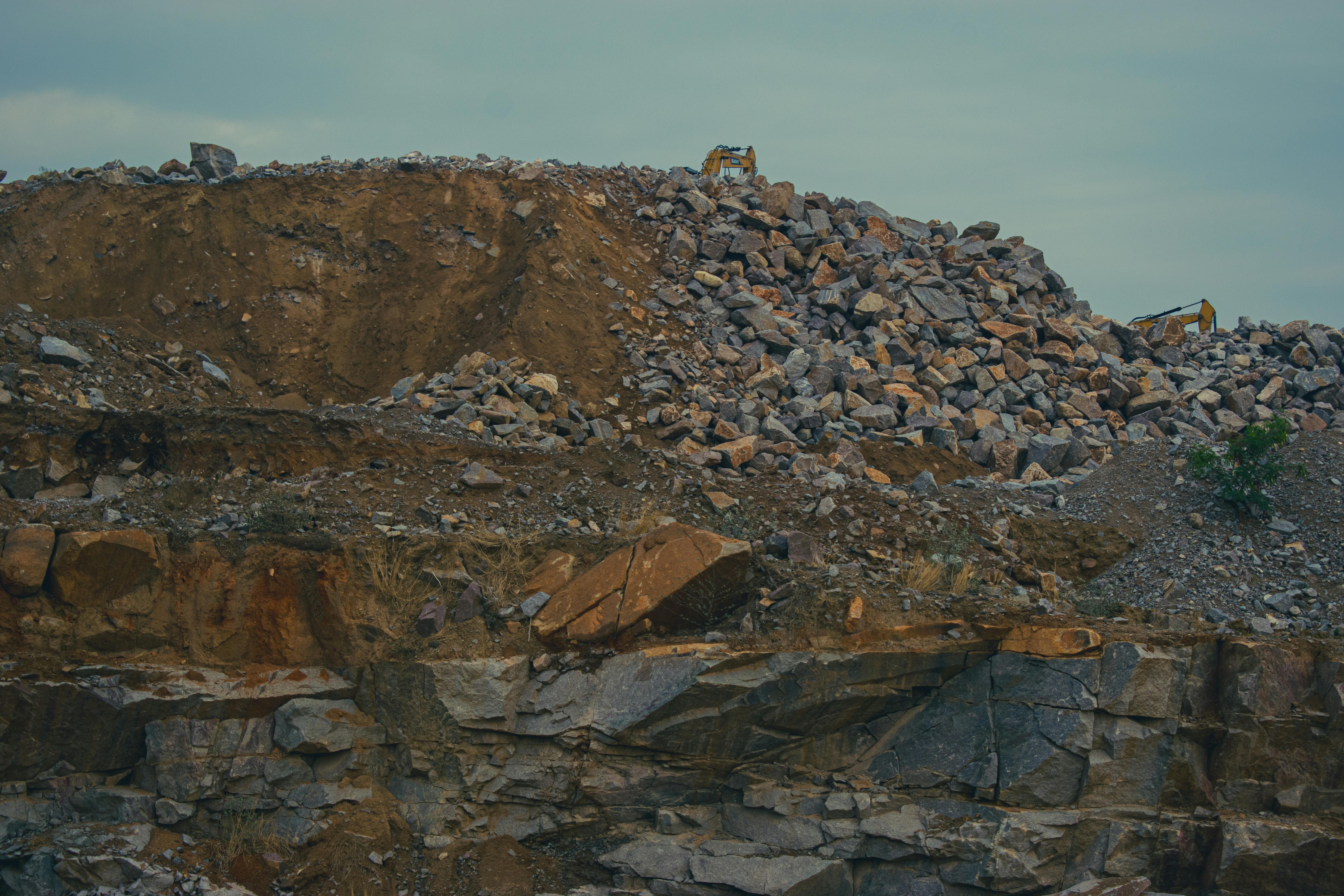 Stones Stacked on Sand Heap · Free Stock Photo