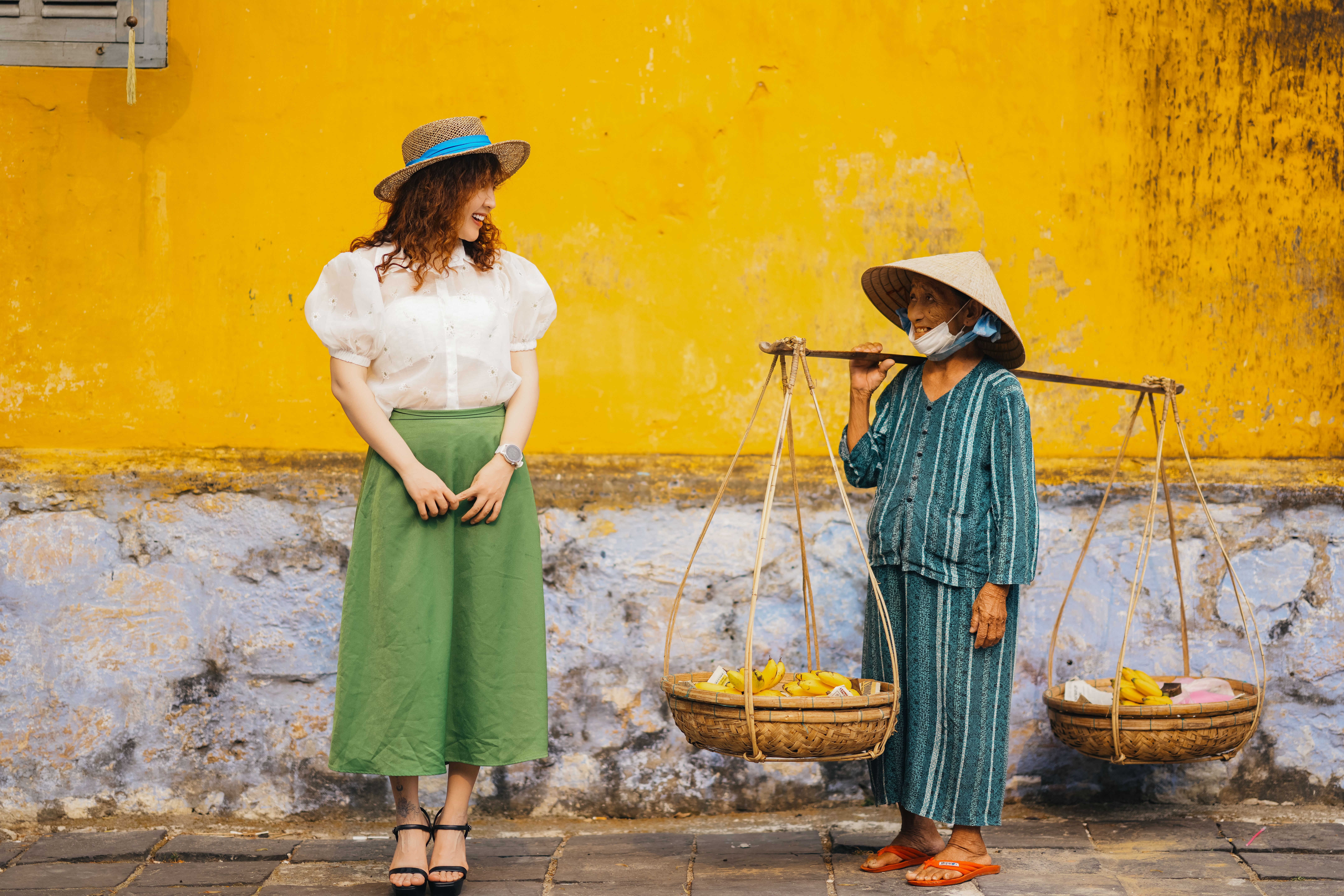 Caucasian Woman Meeting a Local Woman · Free Stock Photo