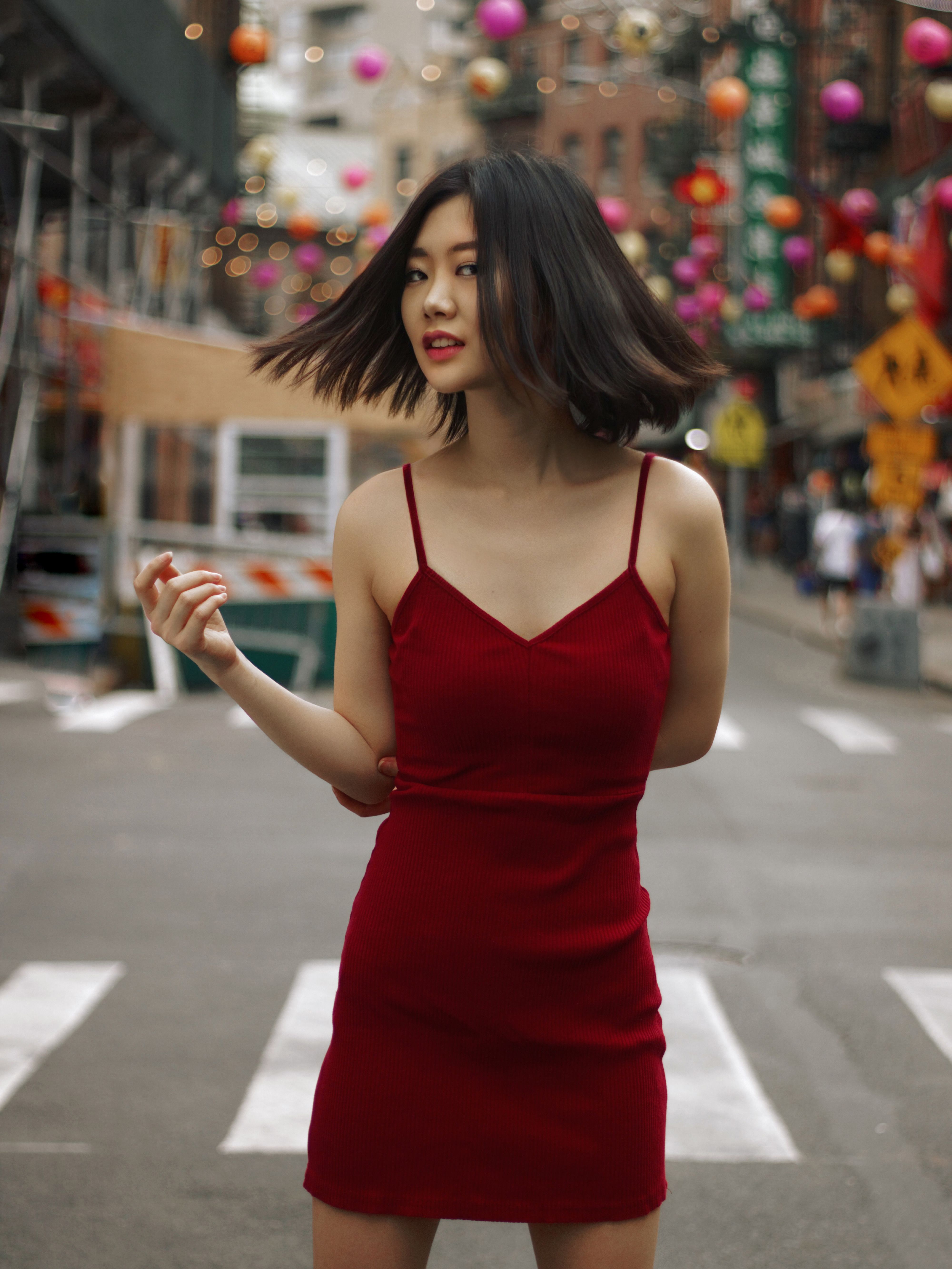 Woman Posing in Red Dress on Street · Free Stock Photo