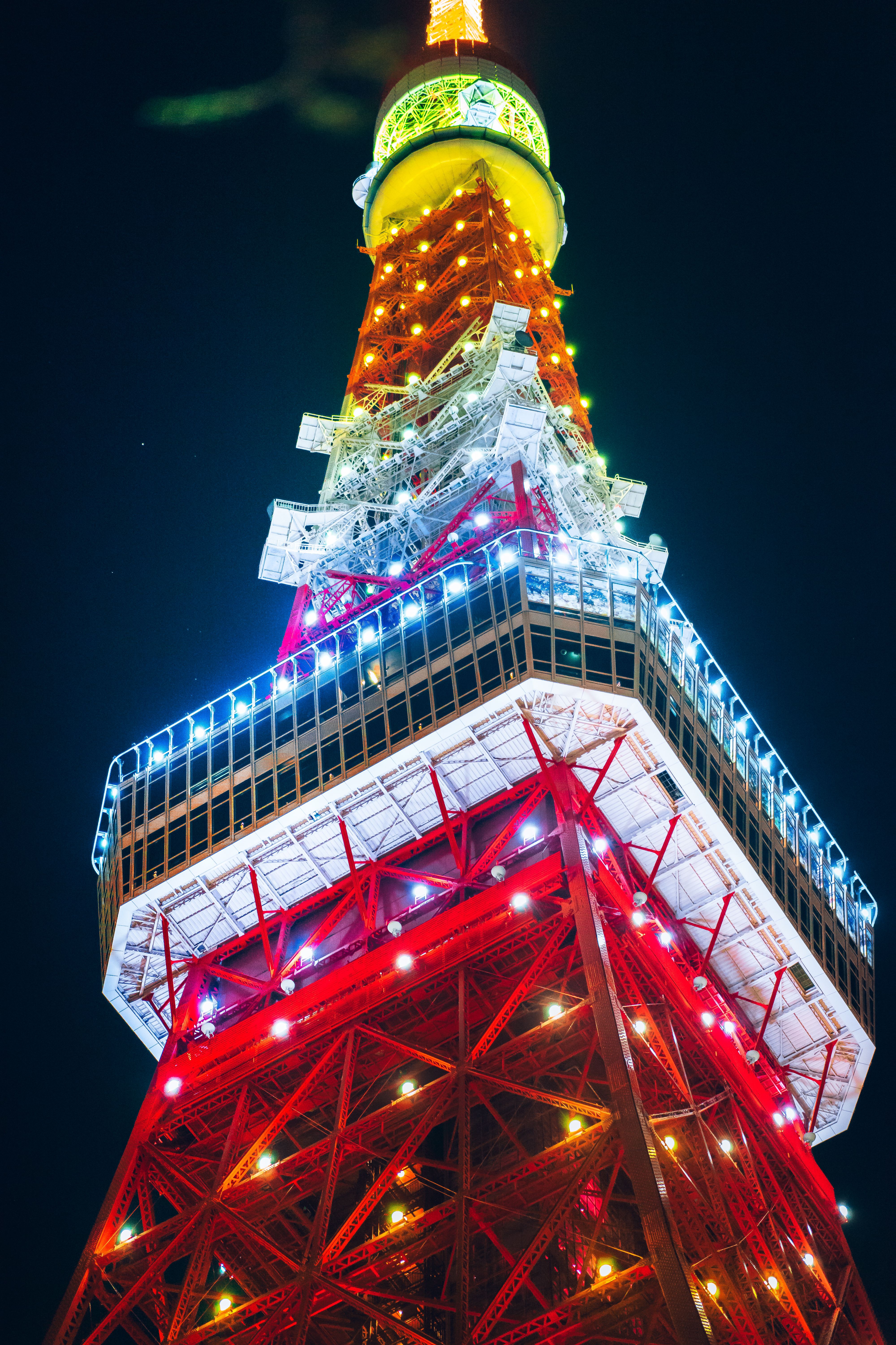 Tokyo tower lit up in red and white · Free Stock Photo