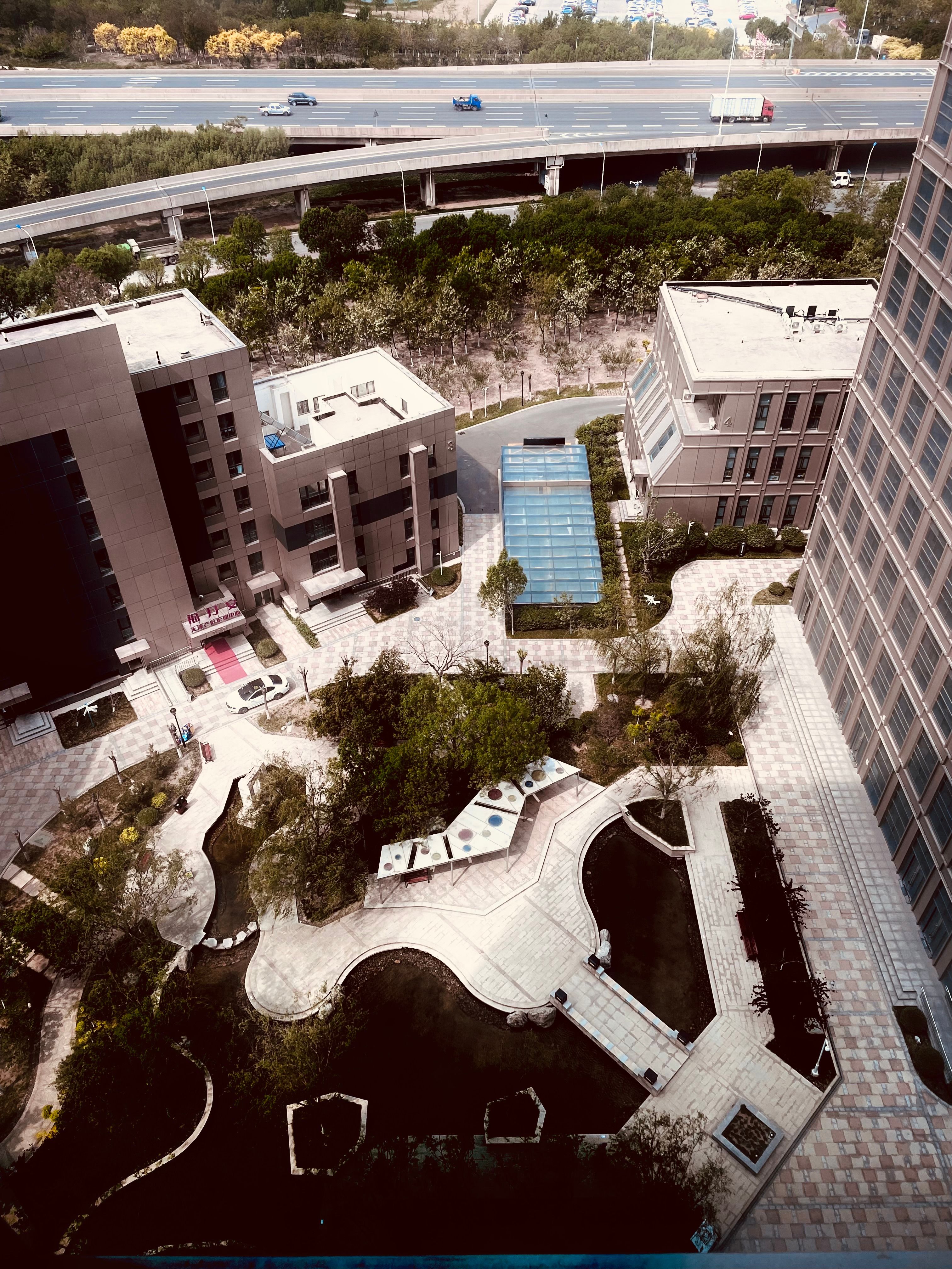 Balcony View of Residential Complex Yard · Free Stock Photo