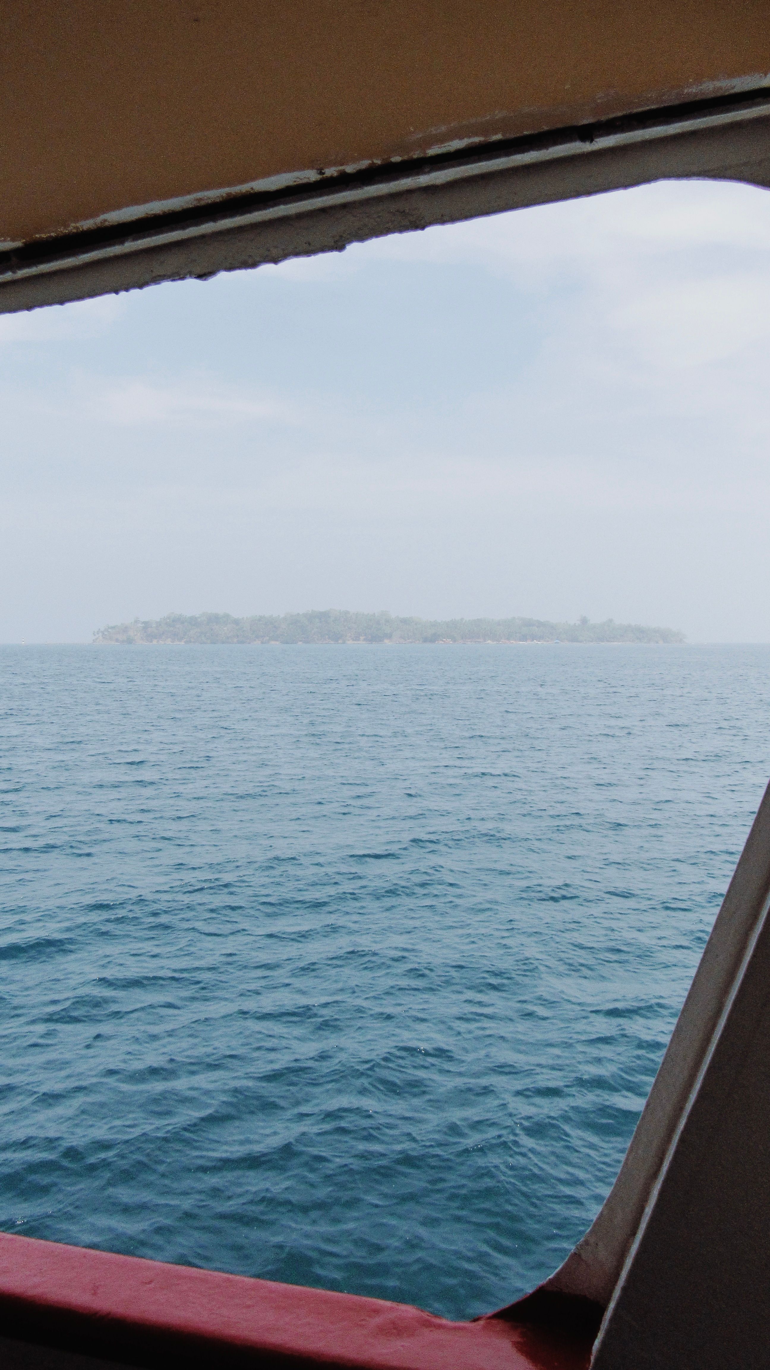 Blue Sea behind Window · Free Stock Photo