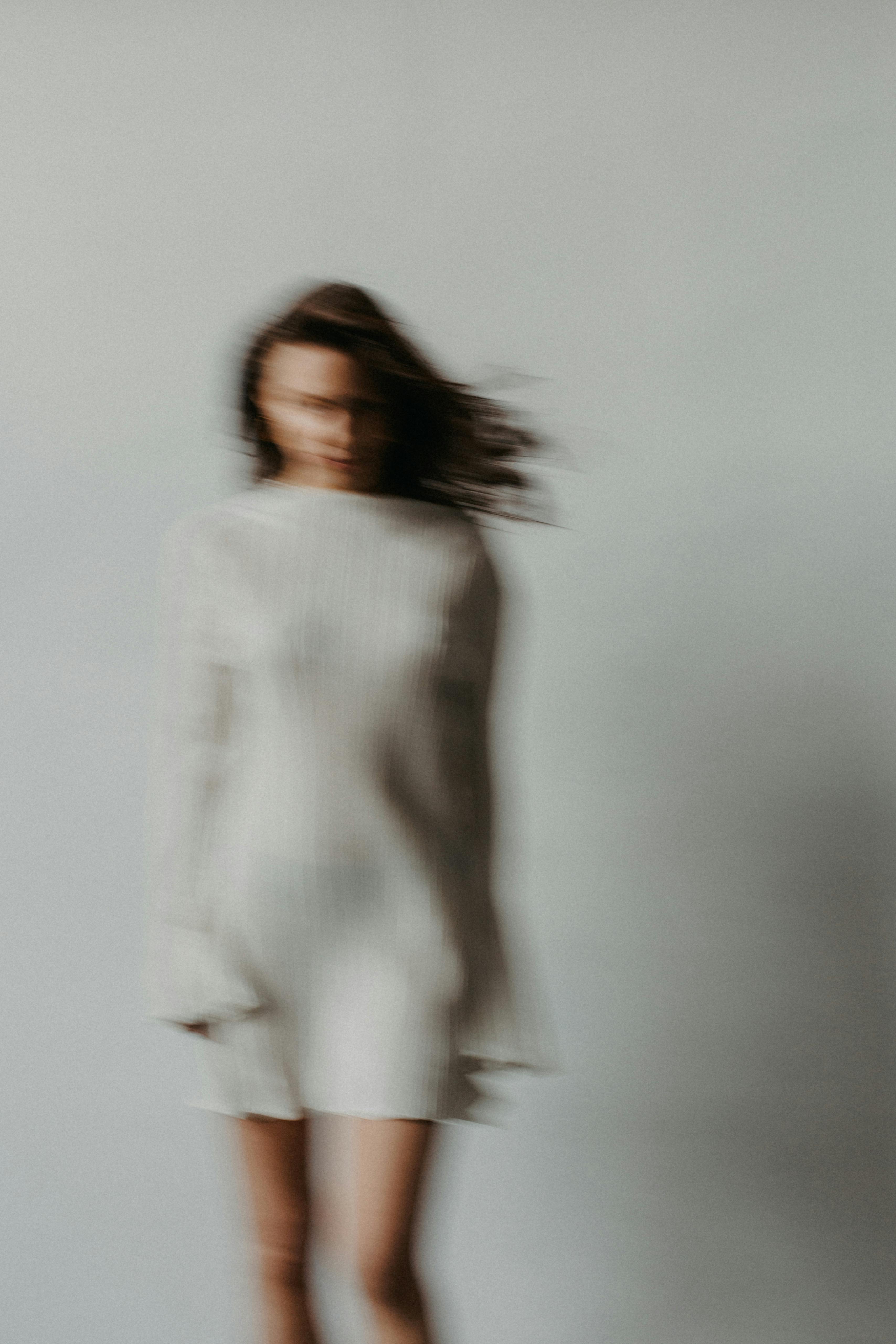 Blurred Woman with Long Hair · Free Stock Photo