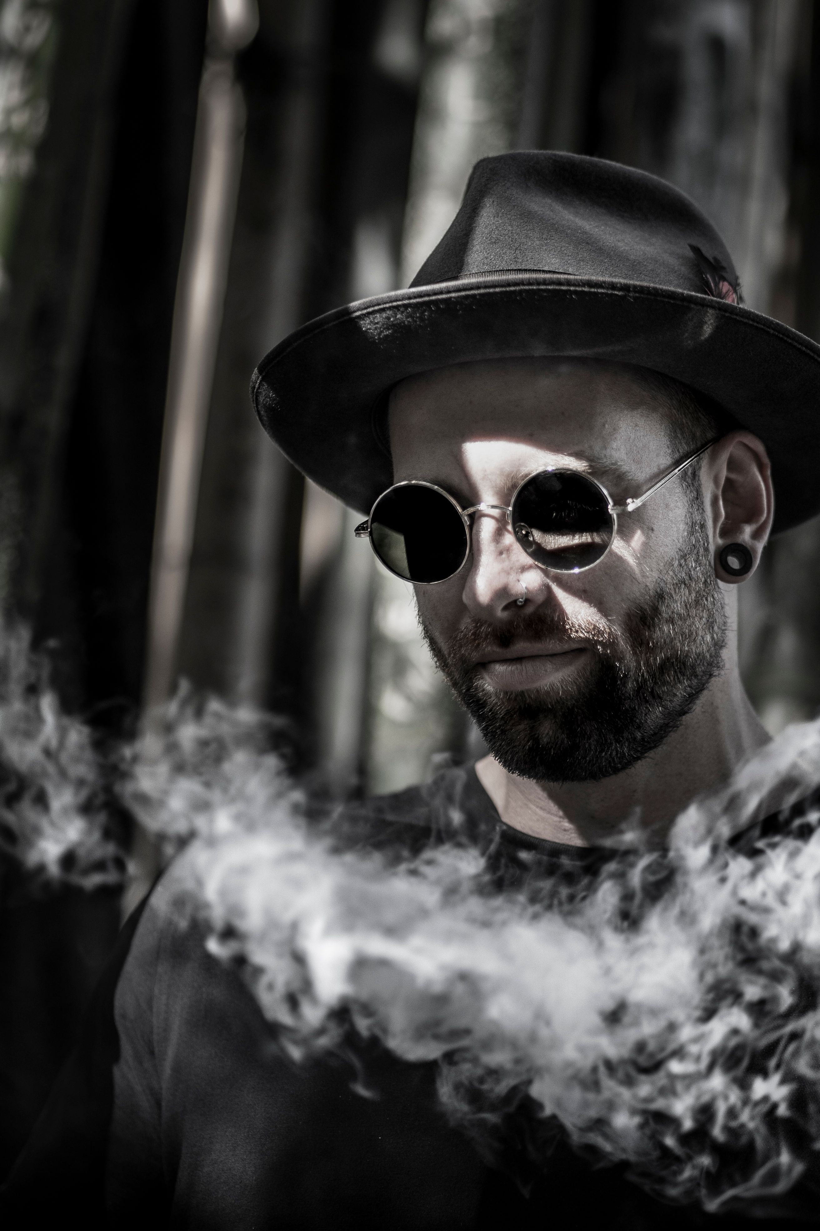 Man Standing with Steam Blowing Out · Free Stock Photo