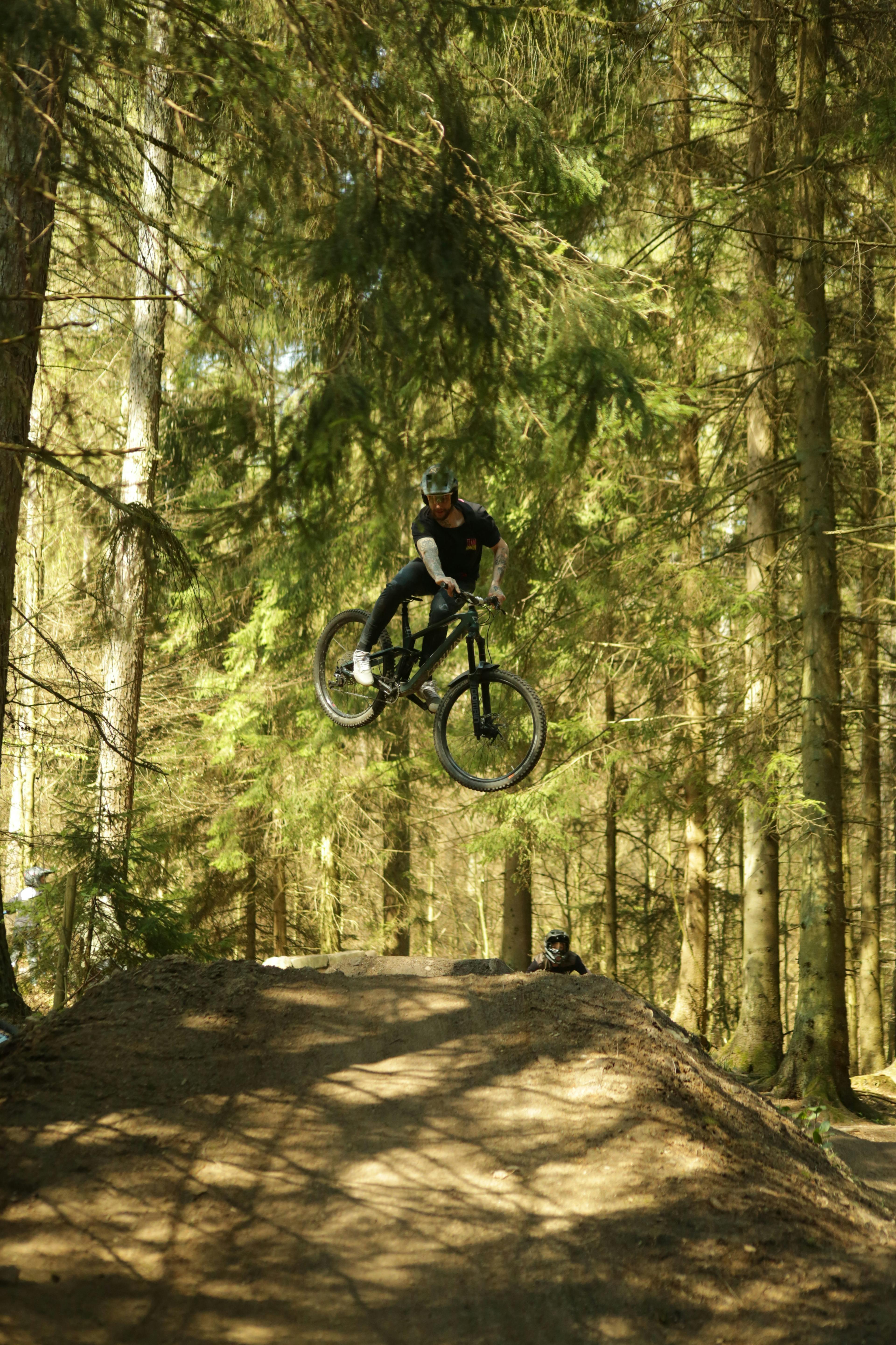 Man Jumping on Bicycle · Free Stock Photo