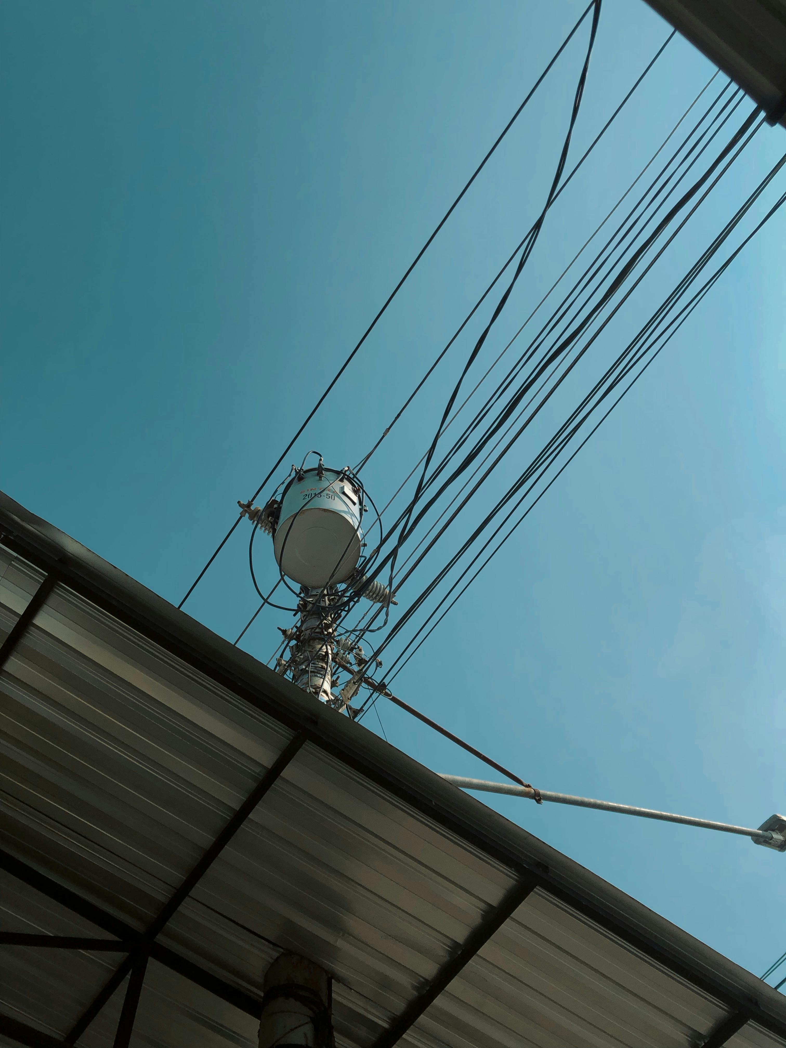 Clear Sky over Power Lines · Free Stock Photo