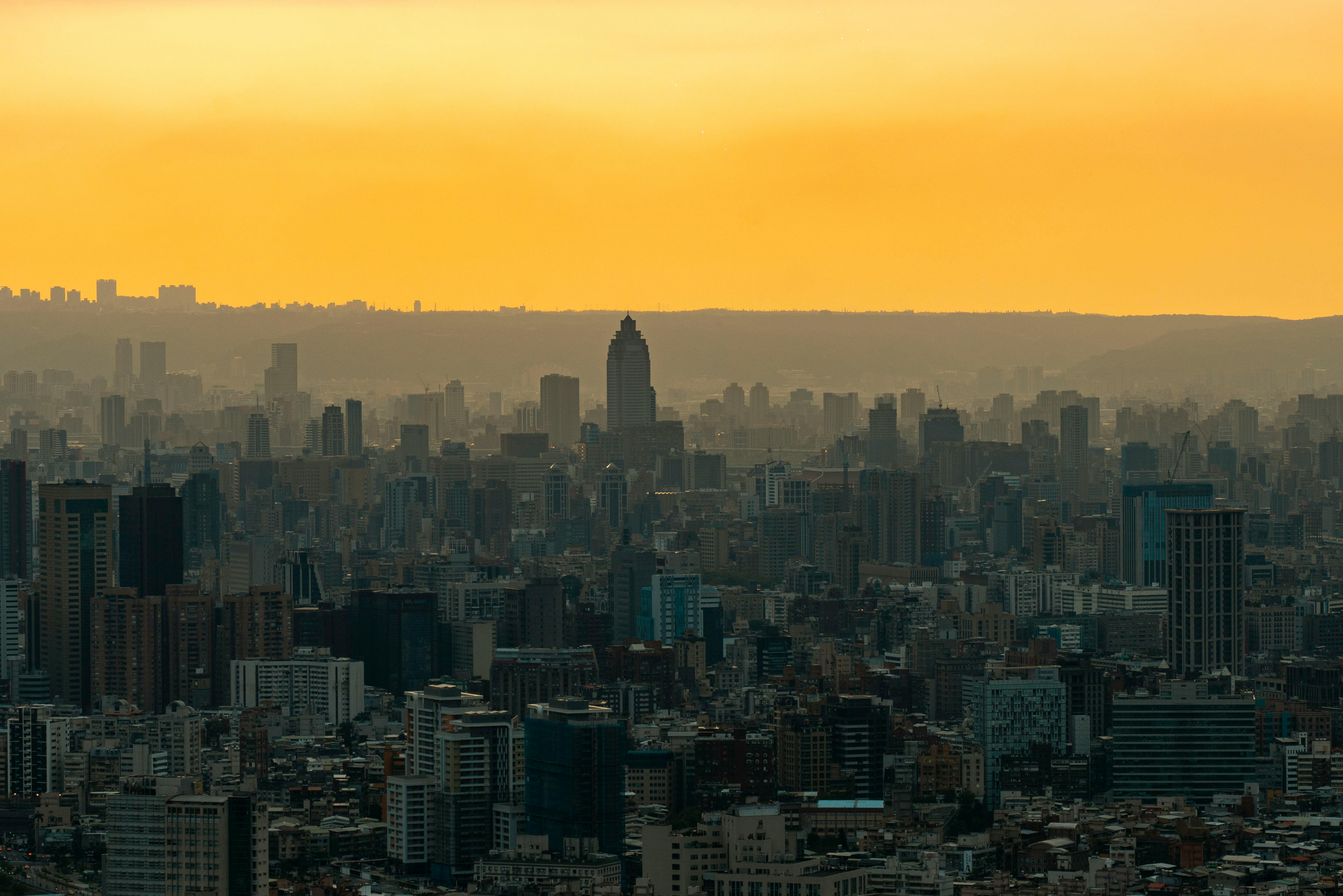 Sunlight over City at Sunset · Free Stock Photo