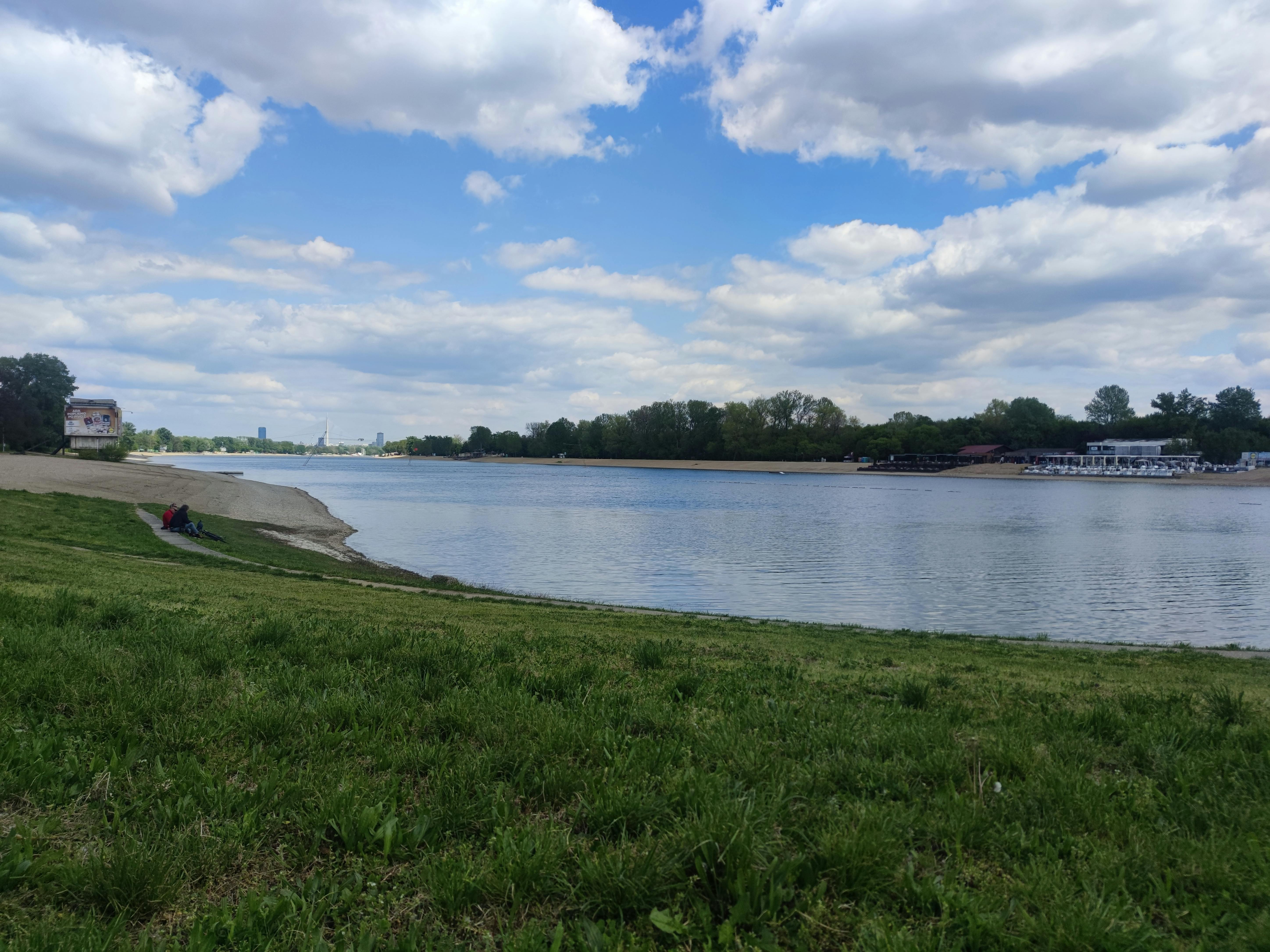Clouds over River and Riverbank · Free Stock Photo