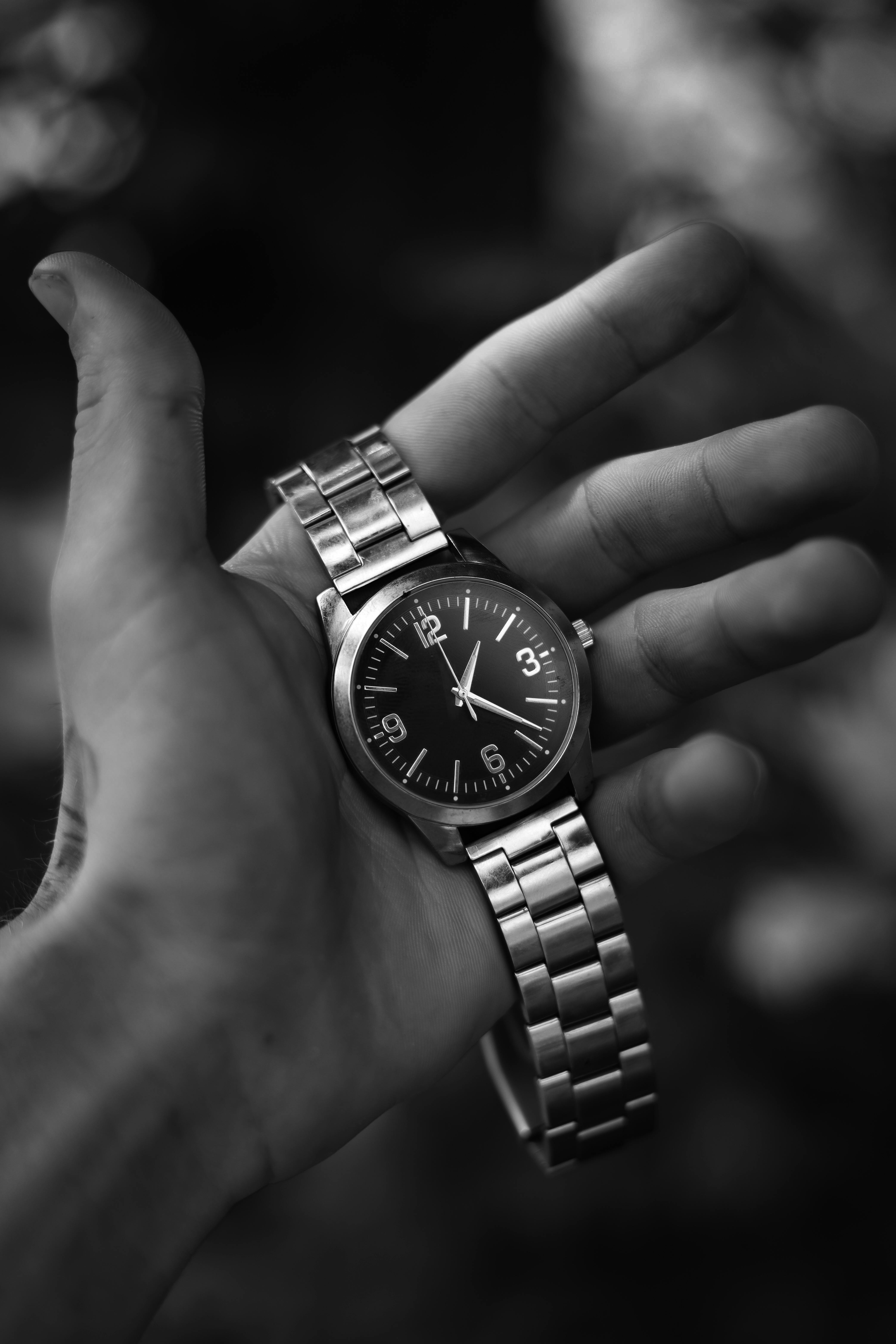 Hand Holding Wristwatch · Free Stock Photo