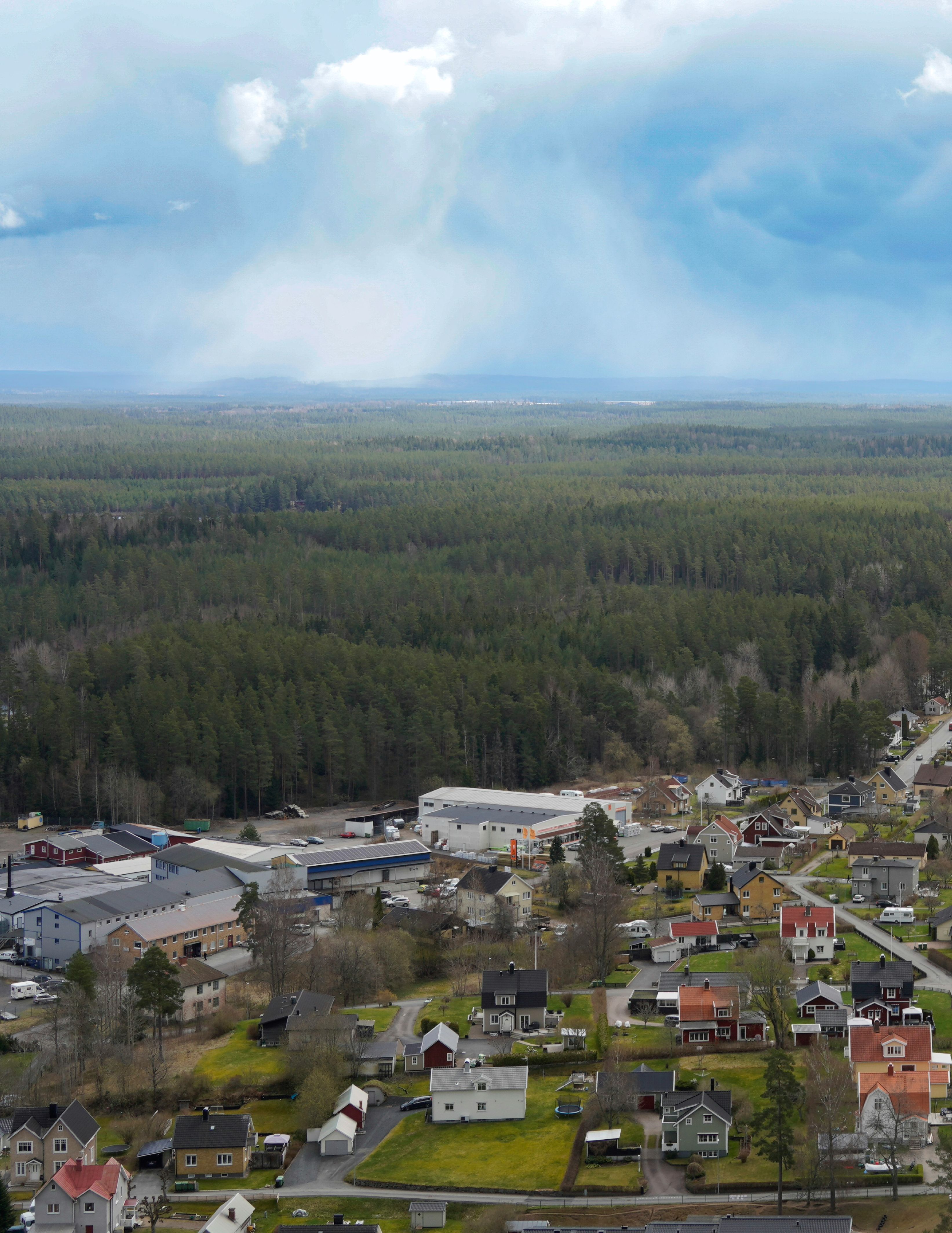 Overcast over Town in Forest · Free Stock Photo