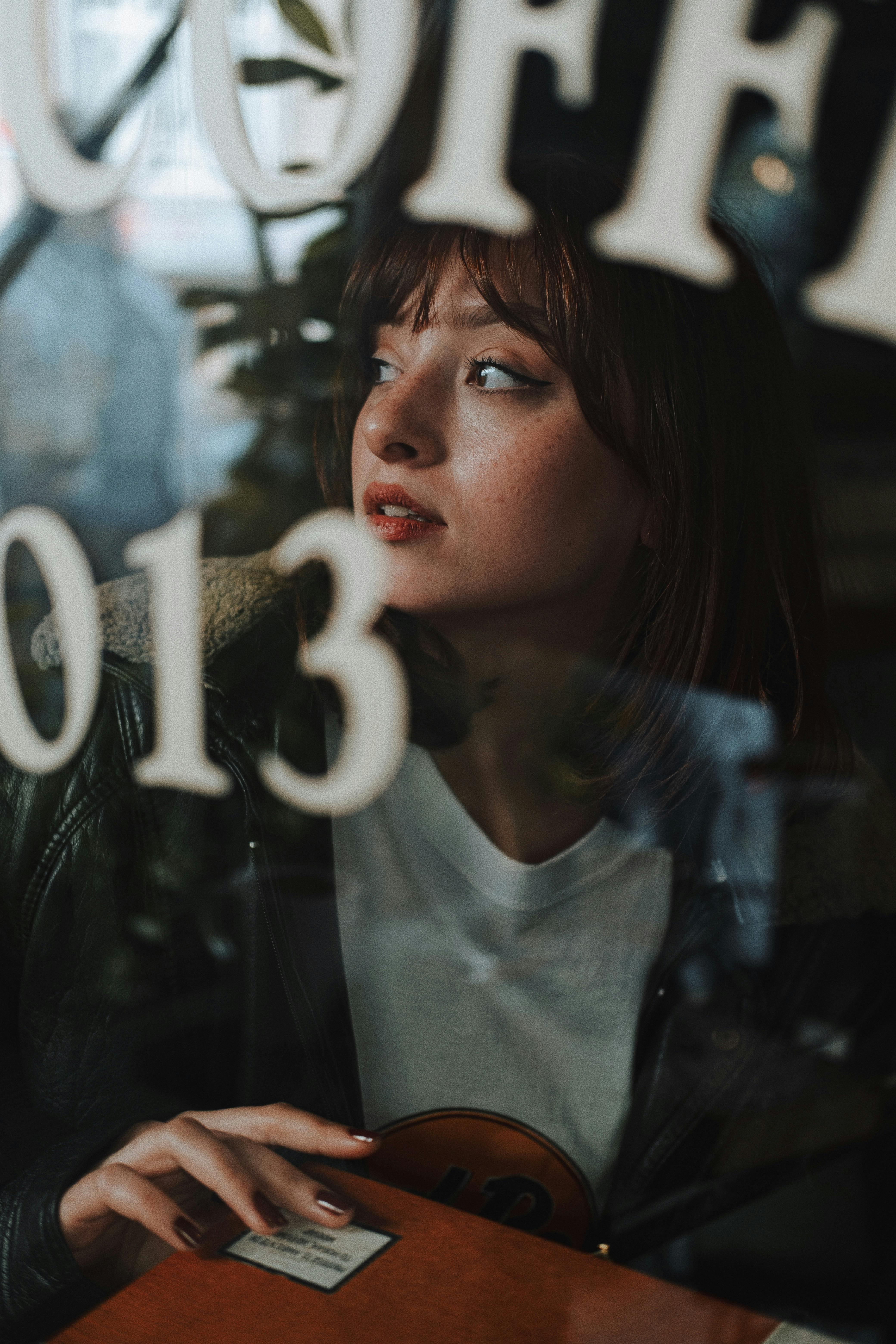Woman behind Window · Free Stock Photo