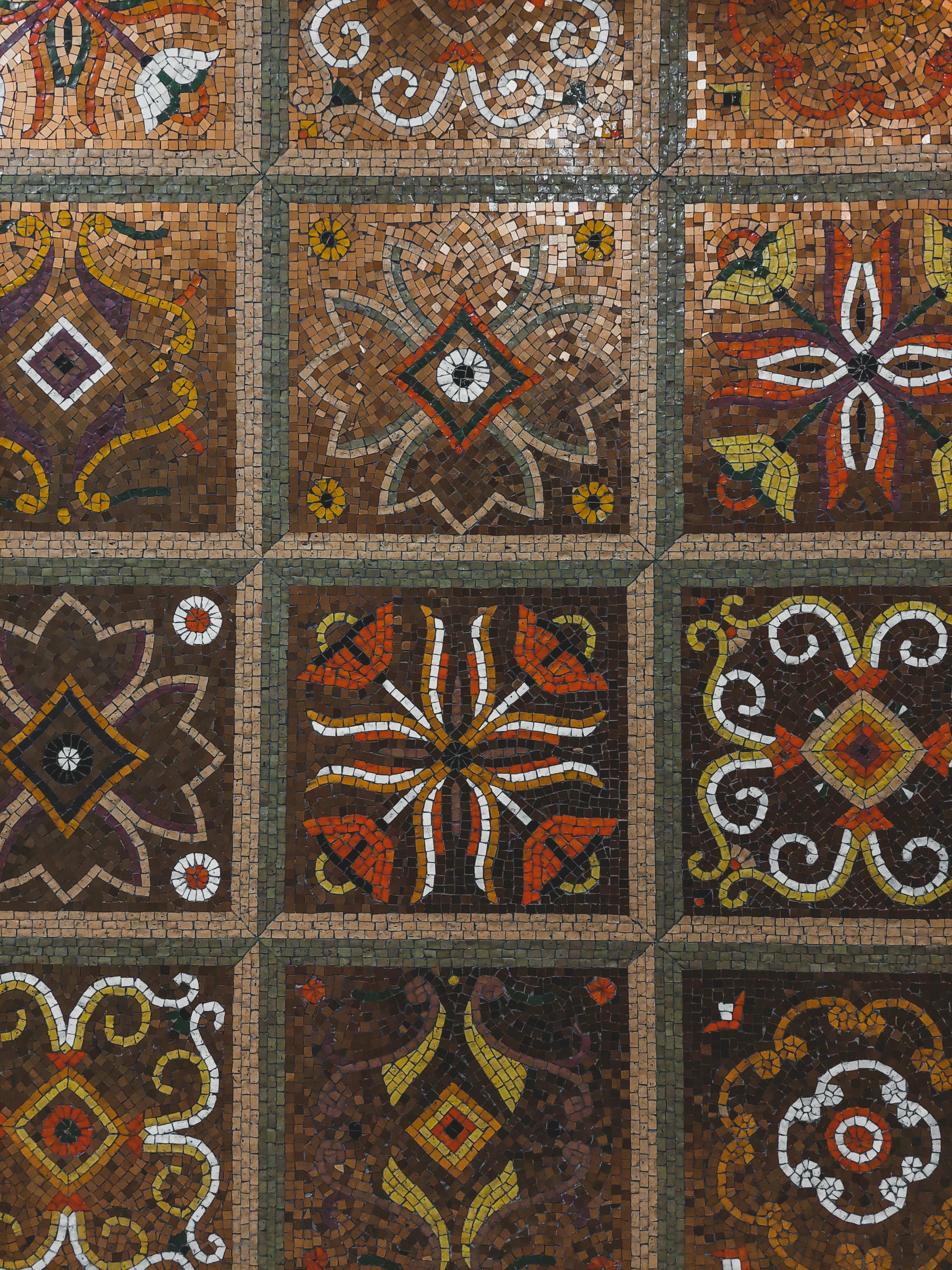 A decorative tile with different designs and colors · Free Stock Photo