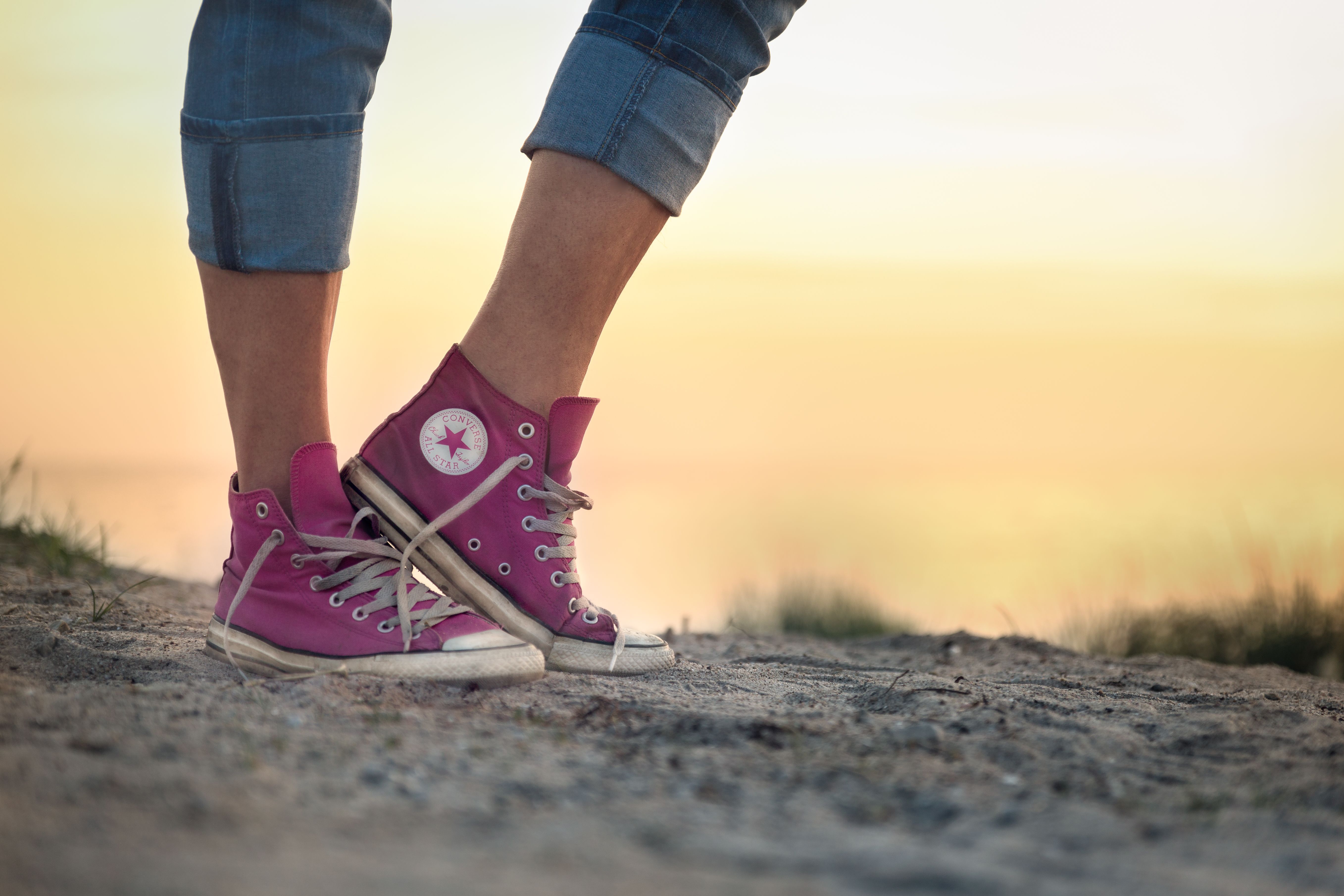Woman Walking on Pathway Under The Sun · Free Stock Photo
