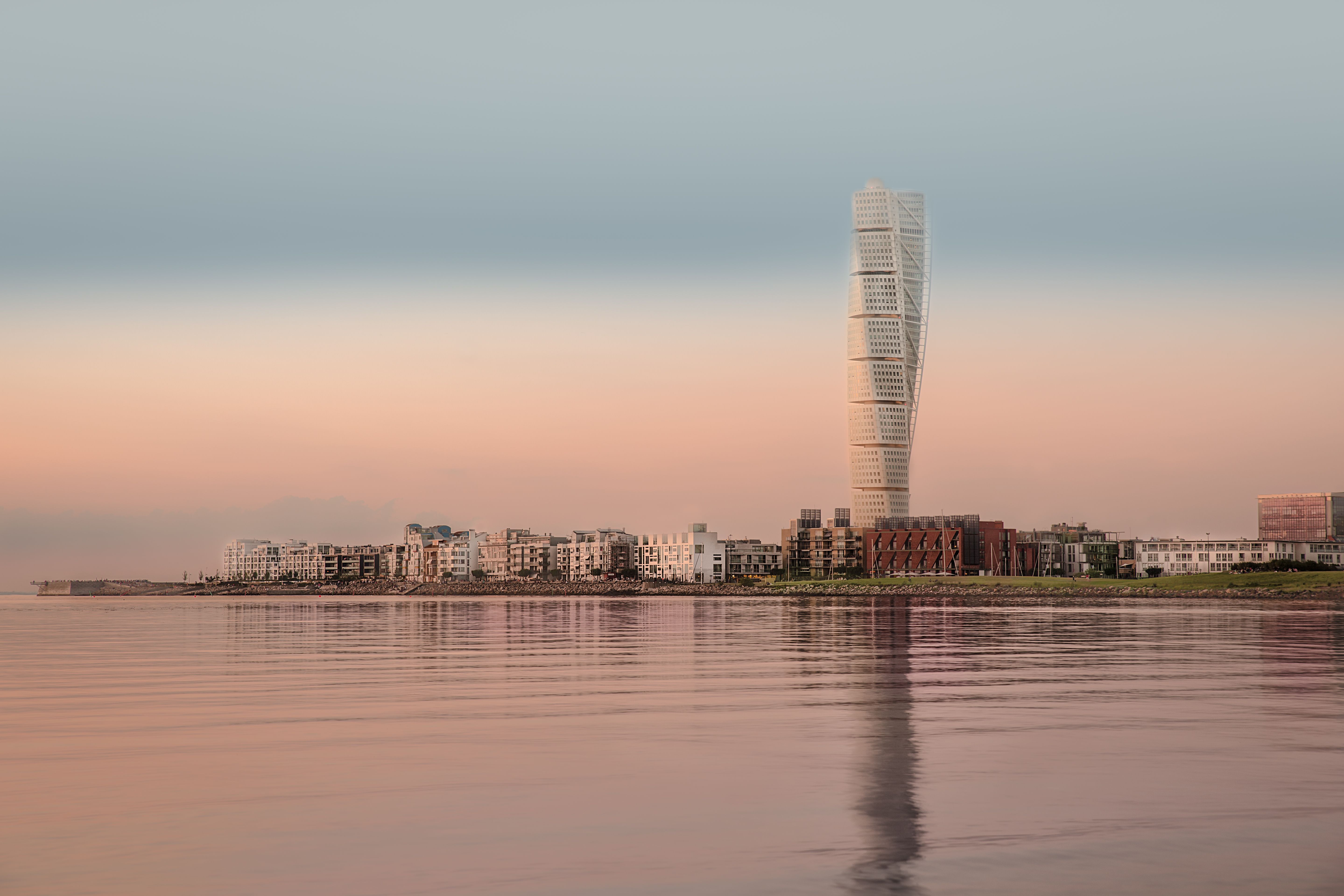 Turning Torso Reflecting in the Water at Sunset in Malmo, Sweden · Free ...