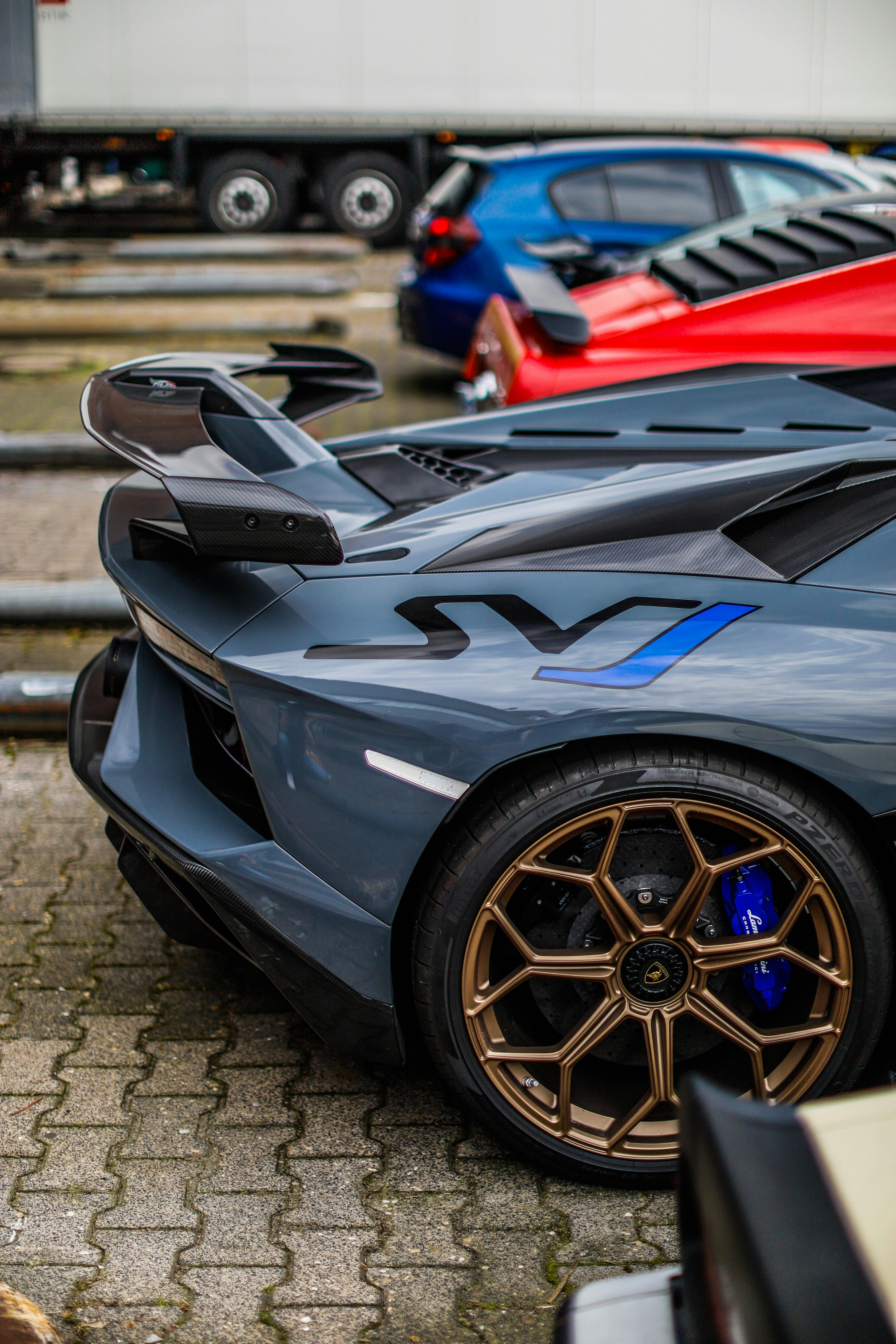 Supercars on a Parking Lot · Free Stock Photo