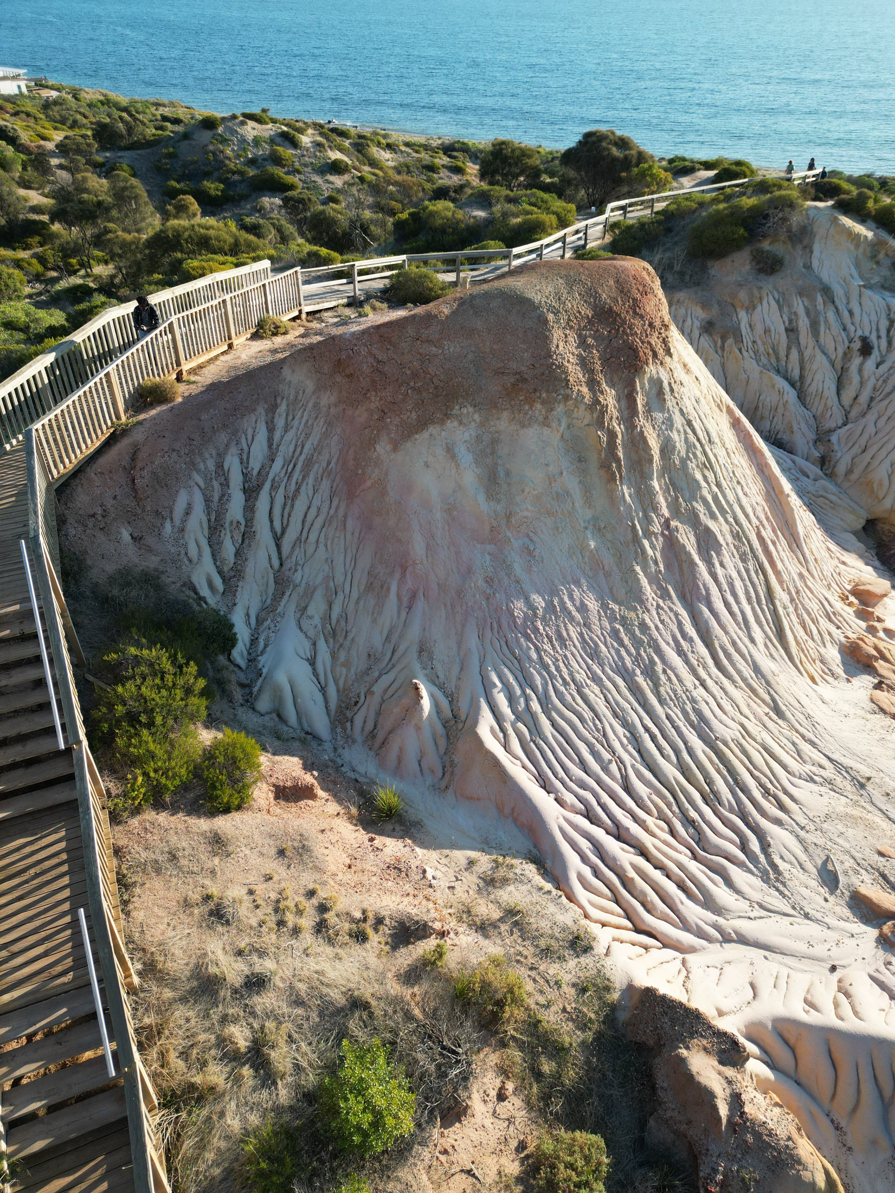 Boardwalk on Rock Formation on Sea Coast · Free Stock Photo