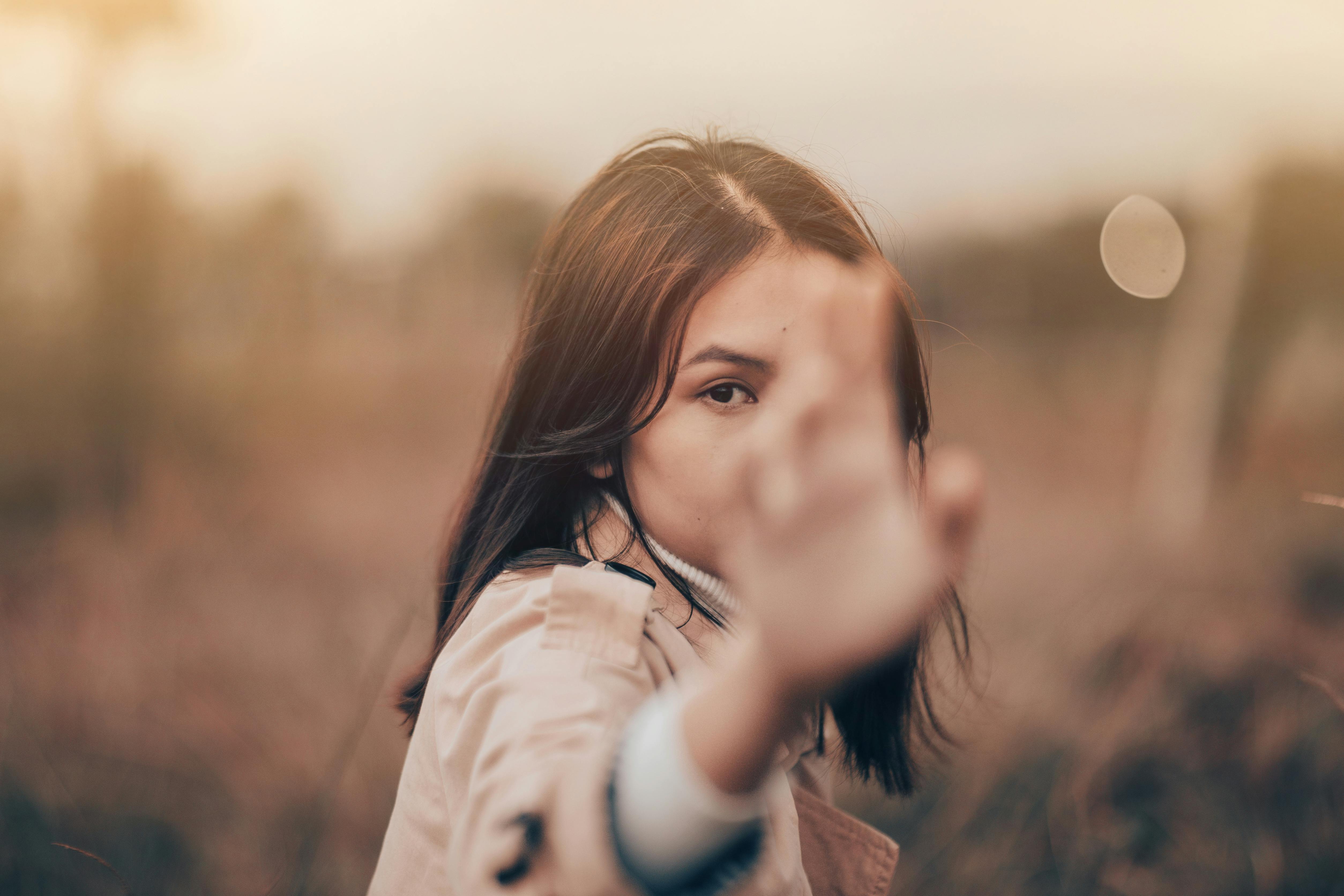 Girl with Face Piercing and a Message Written on Her Cheeks and ...