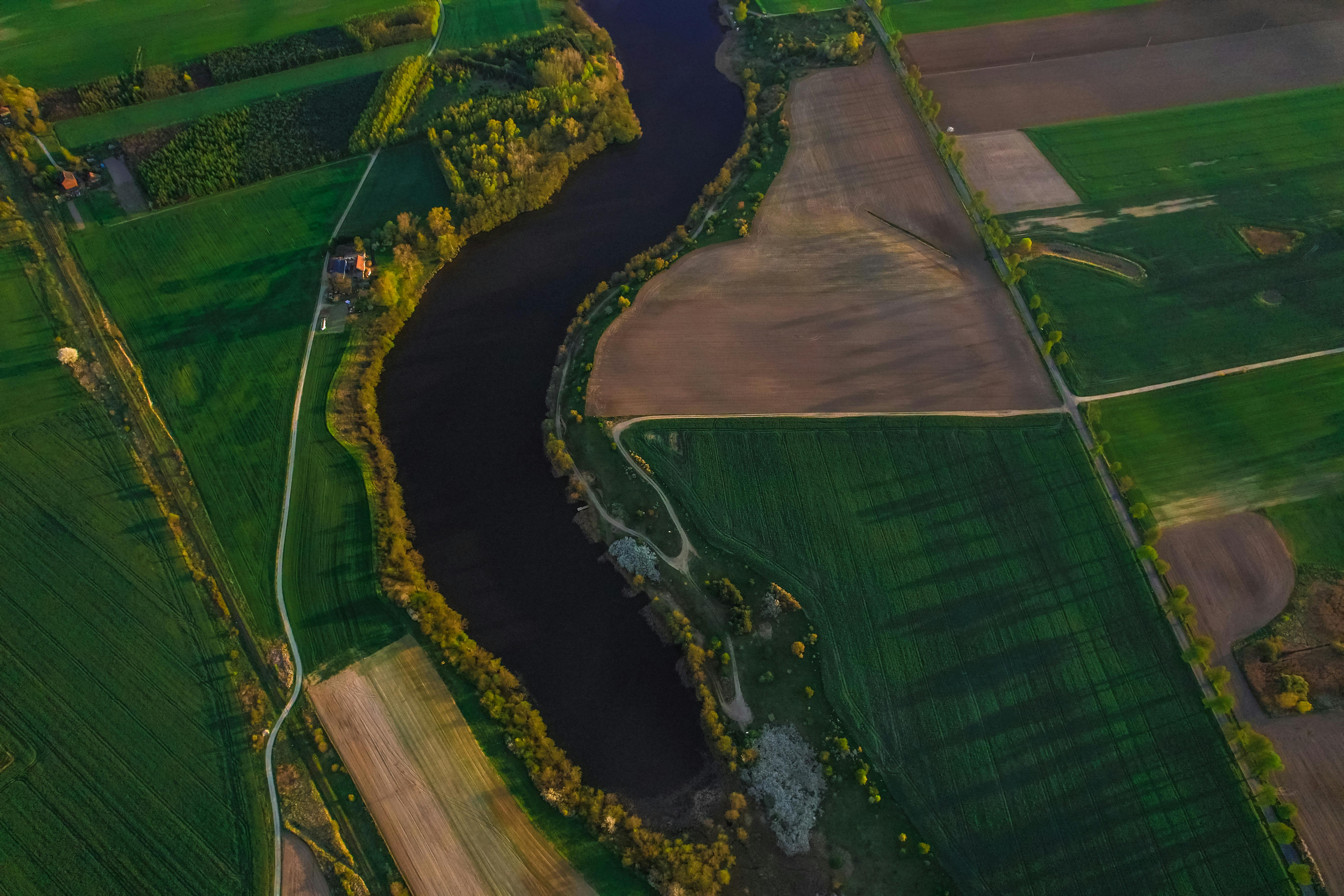 Top View of a River and Croplands · Free Stock Photo
