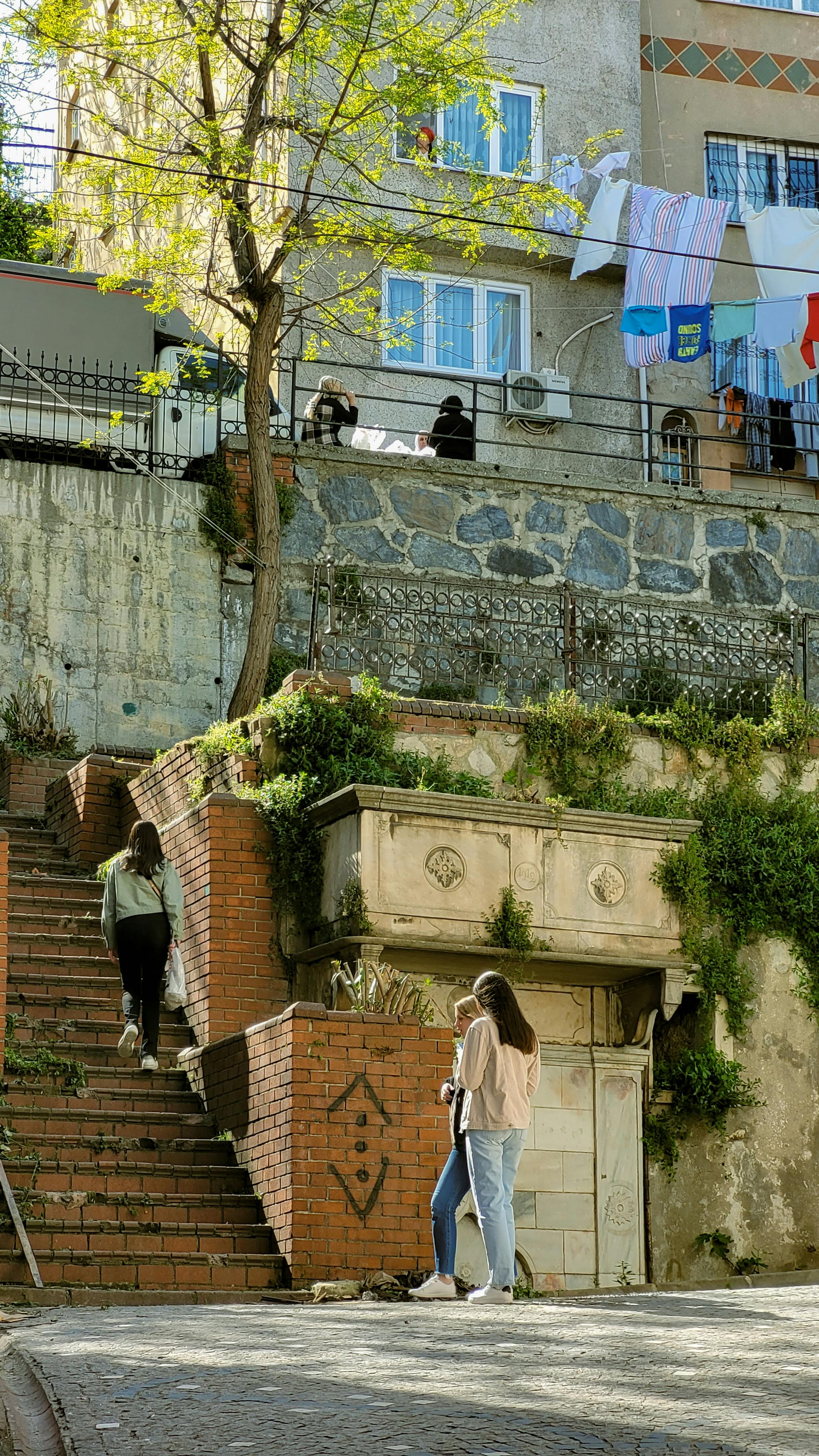 Girls Walking Up Urban Stairs · Free Stock Photo