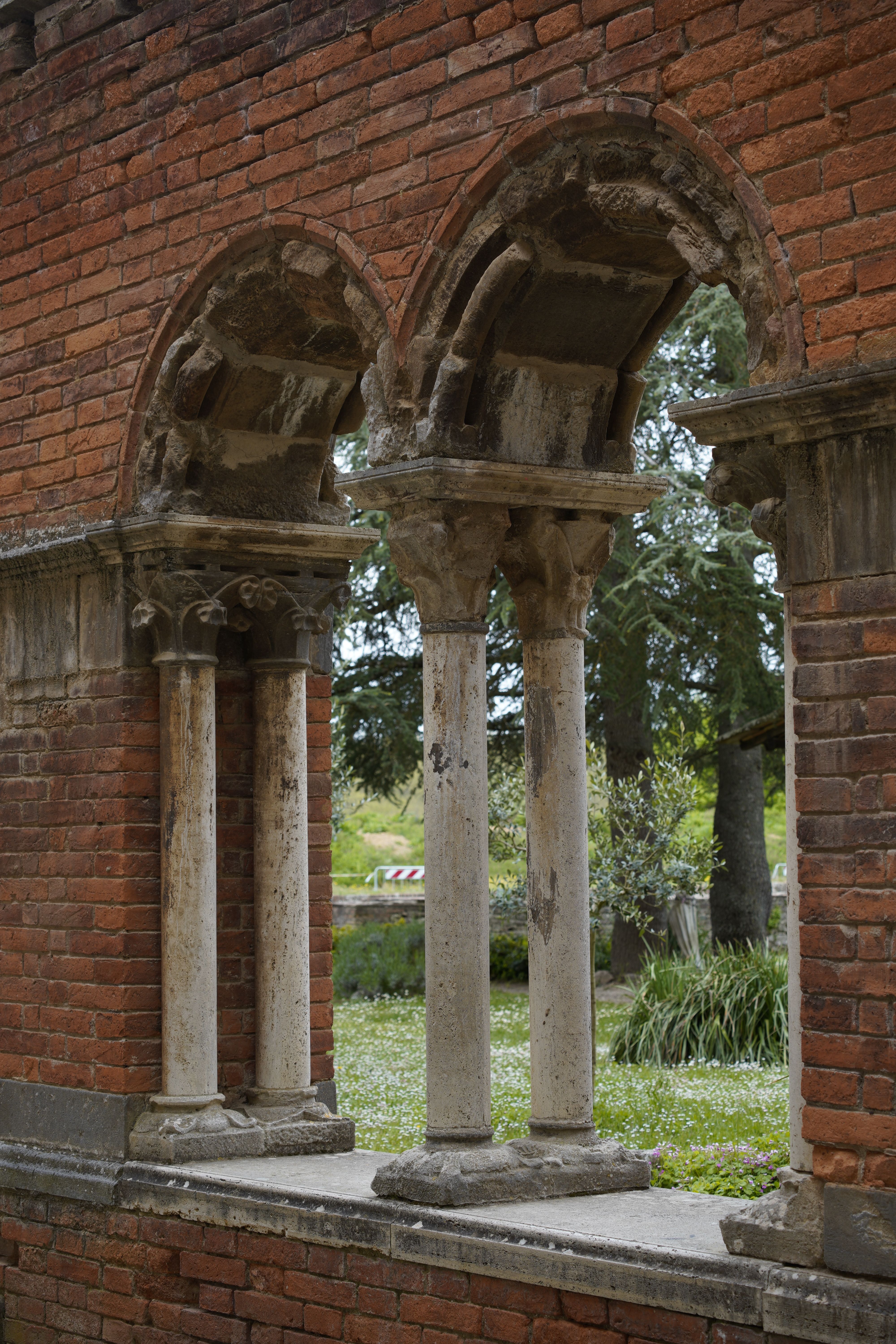 Columns in Window Opening of Bricks Wall · Free Stock Photo