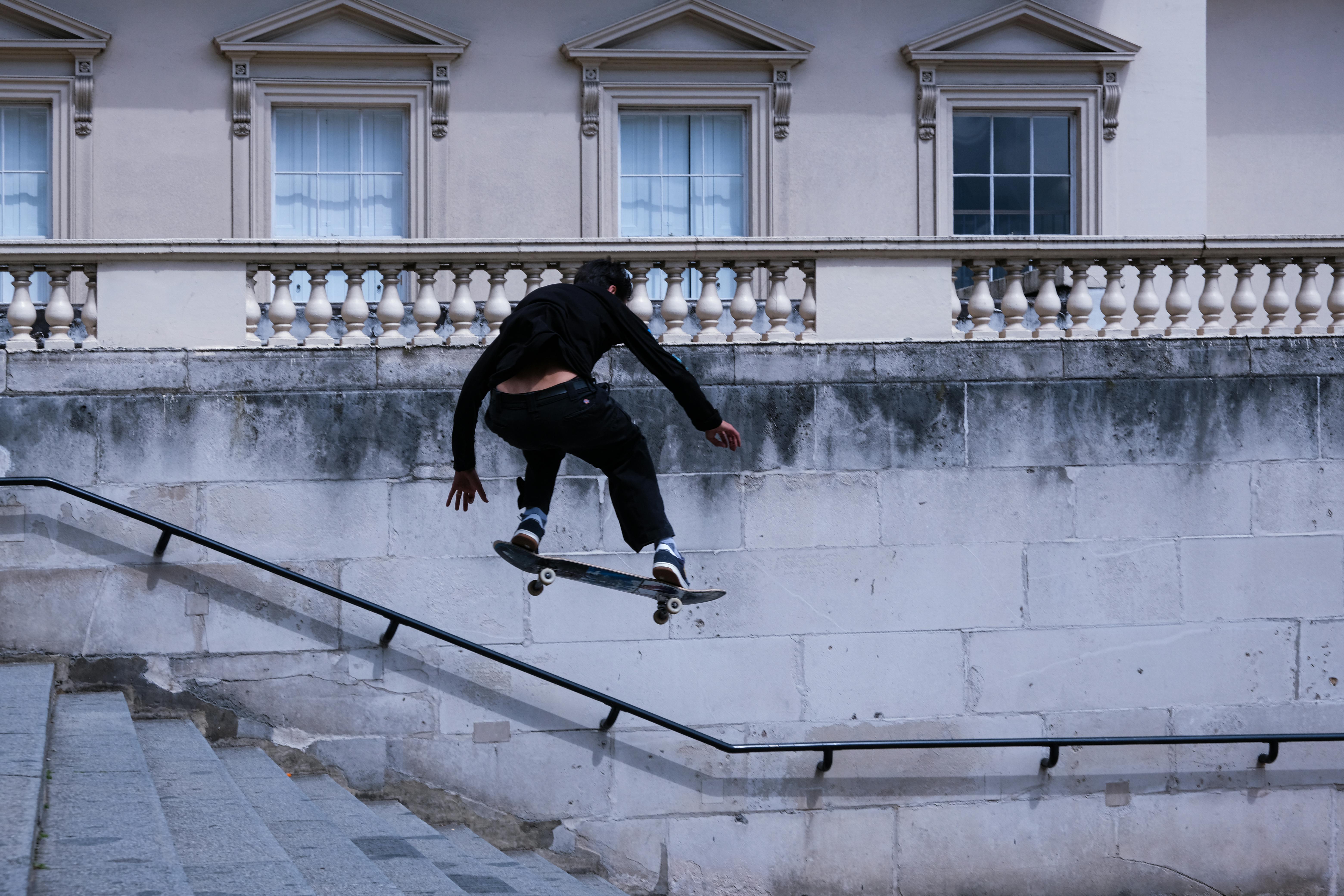 Skater Jumping over Steps · Free Stock Photo