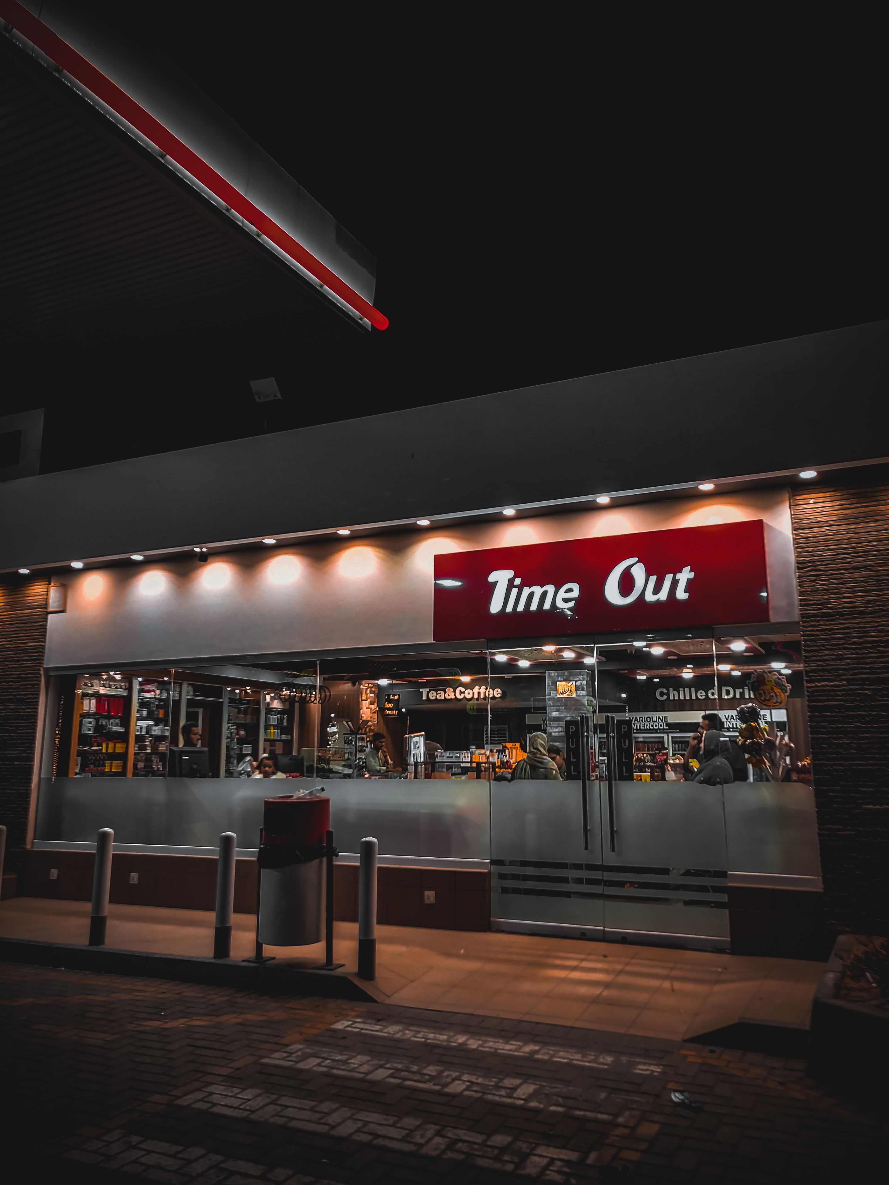 Convenience Store Frontage During Night Time · Free Stock Photo