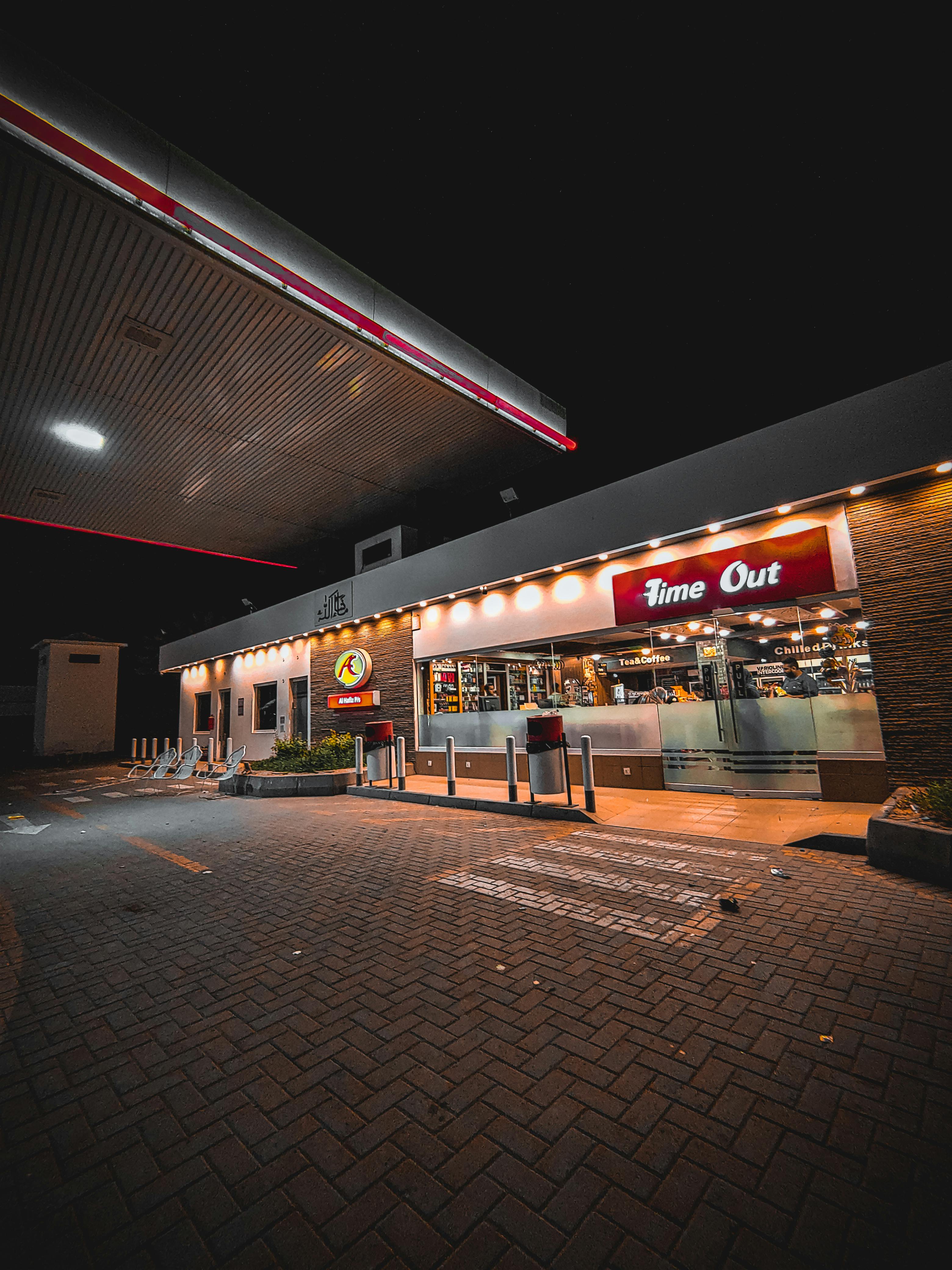 Restaurant at a Gas Station at Night · Free Stock Photo