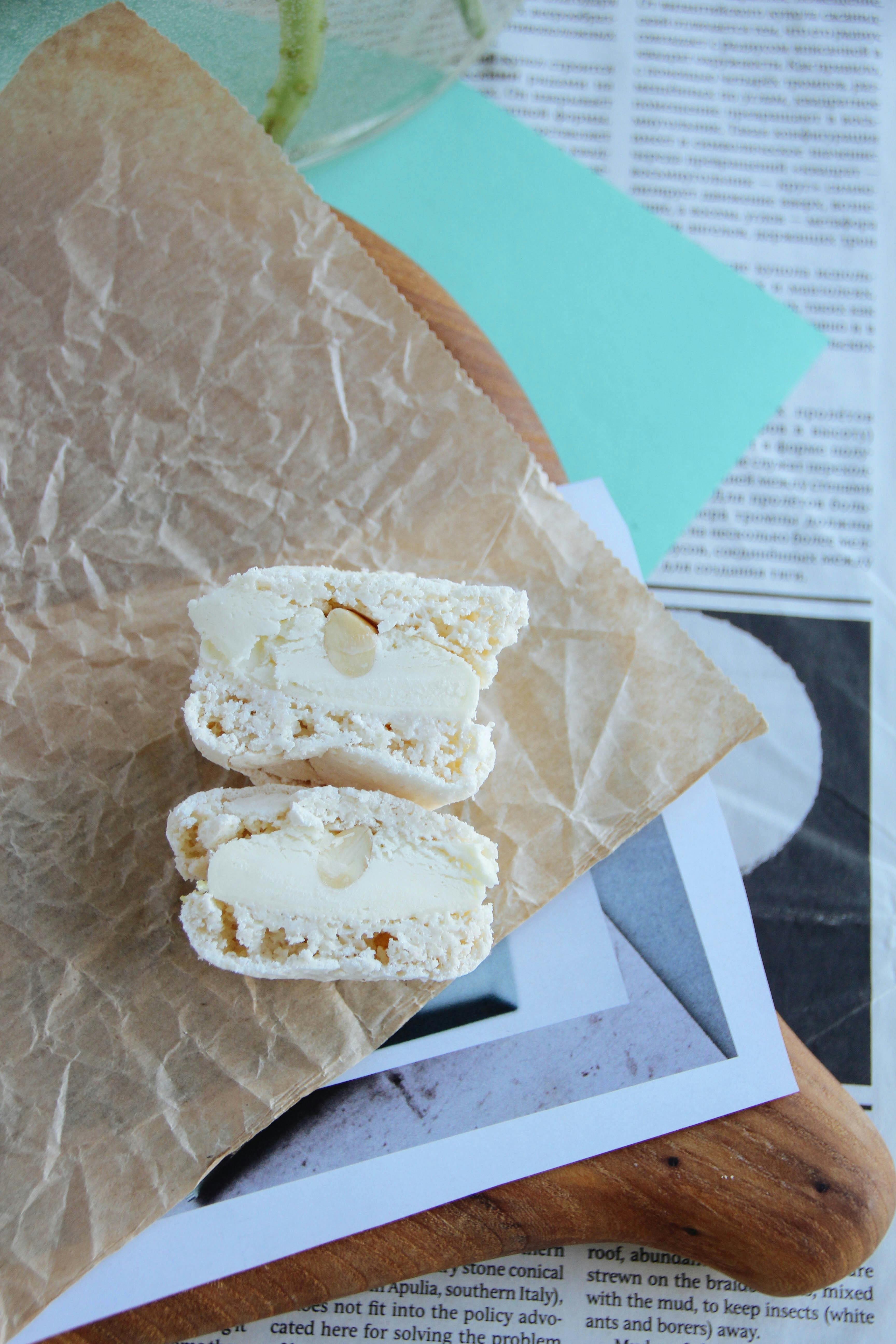 Vanilla Macaron Cut in Half · Free Stock Photo