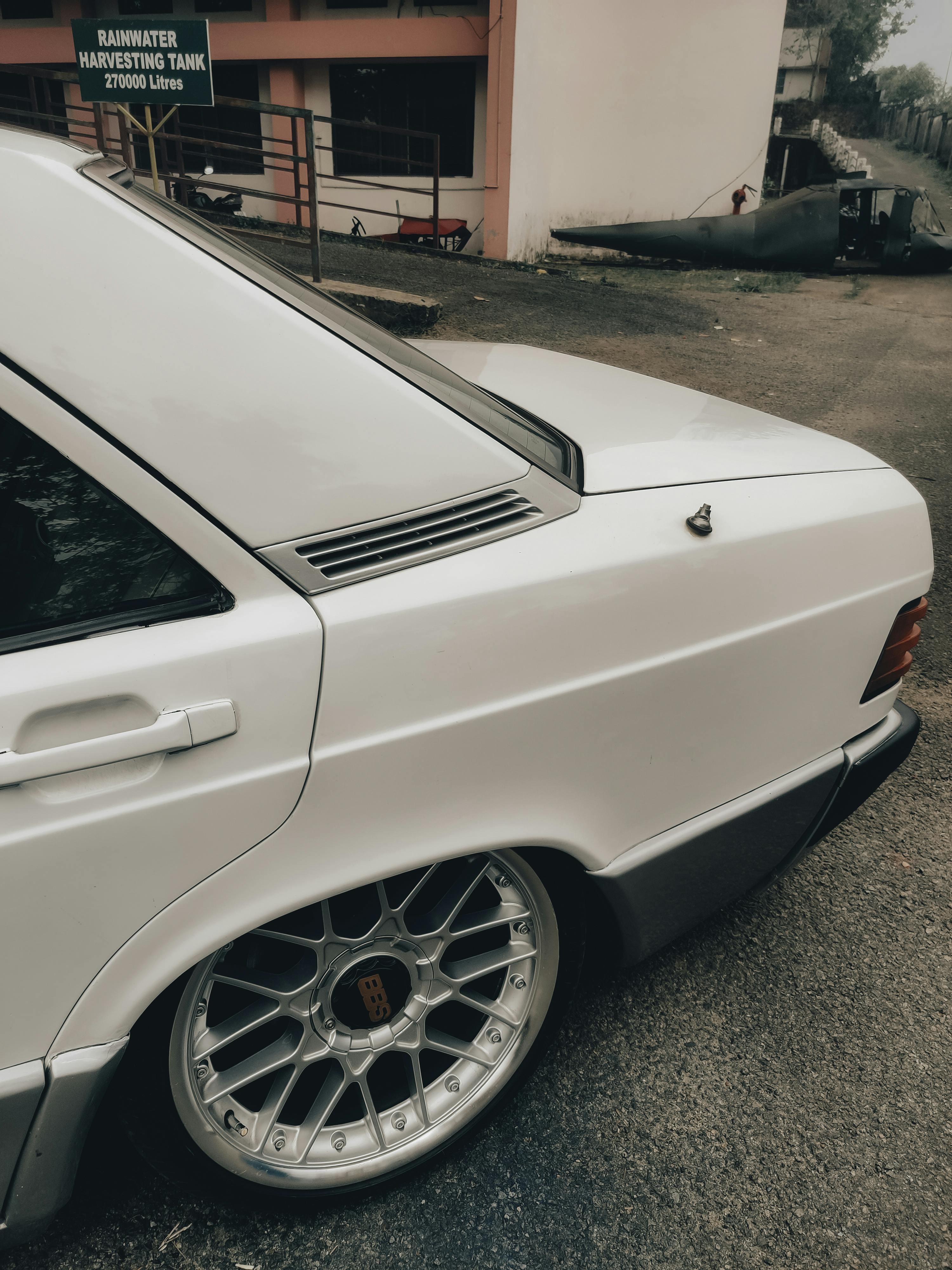 A Modified White Mercedes-Benz 190 · Free Stock Photo