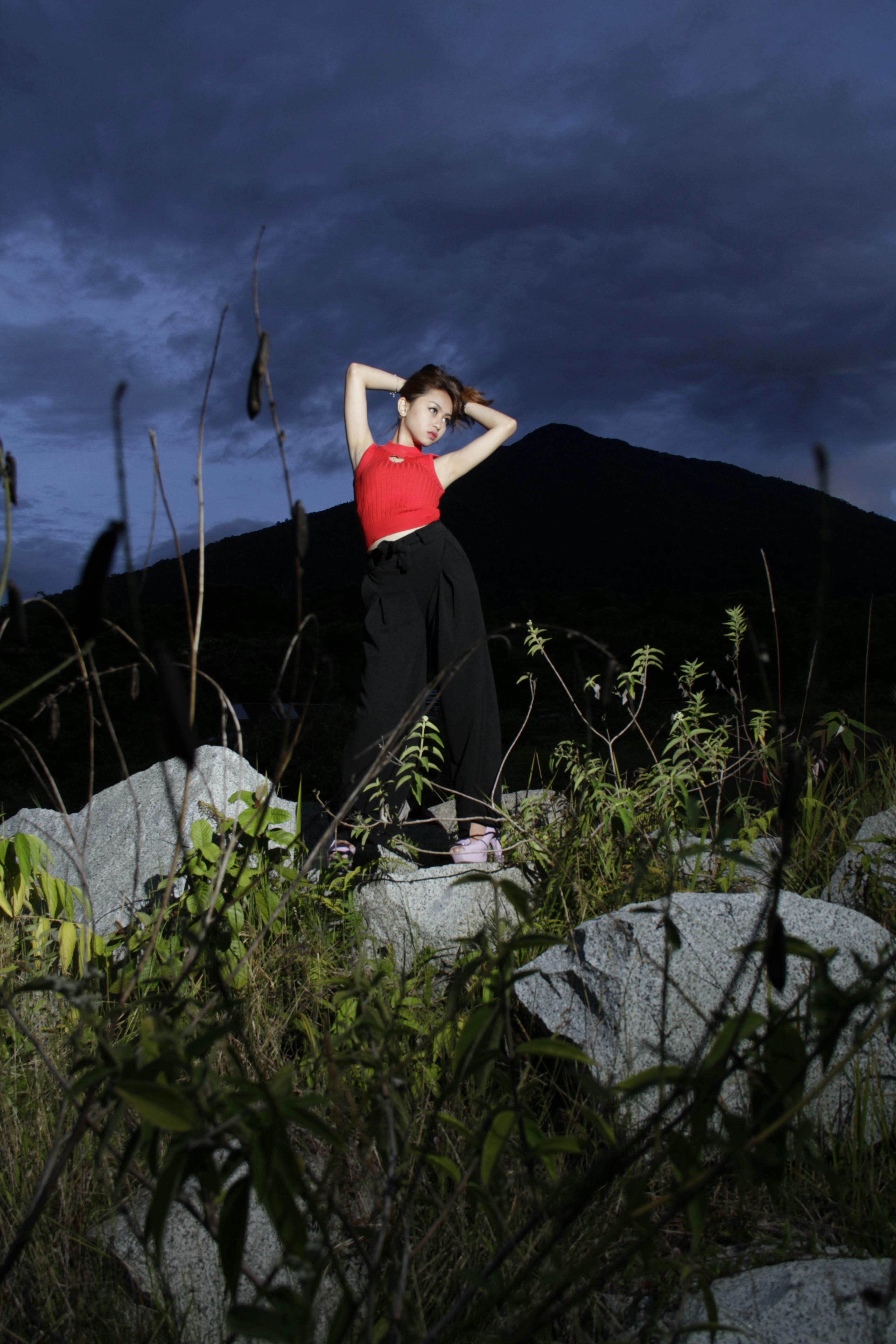 Woman Posing on Rocks · Free Stock Photo
