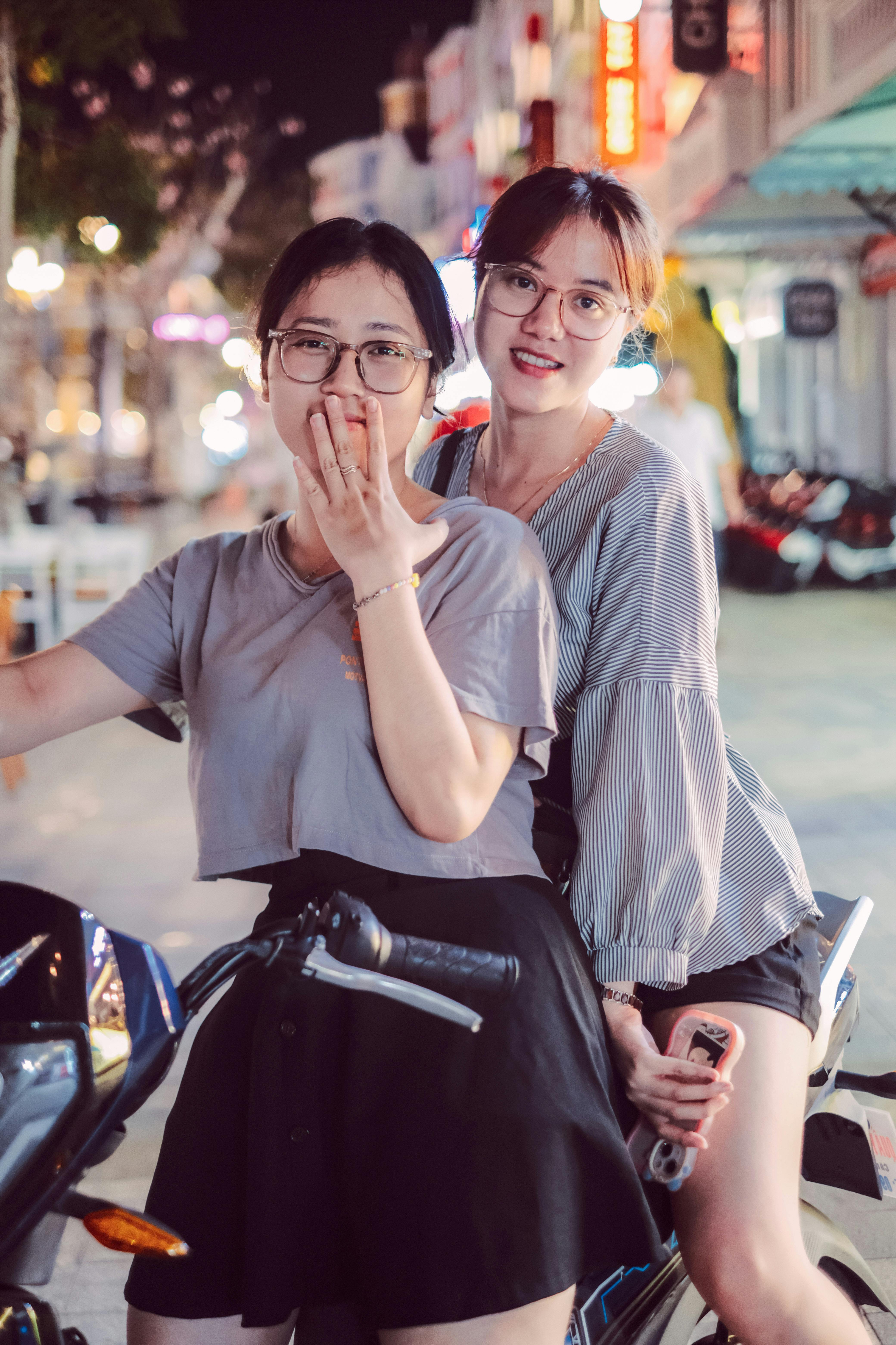 Women on Scooter at Night · Free Stock Photo