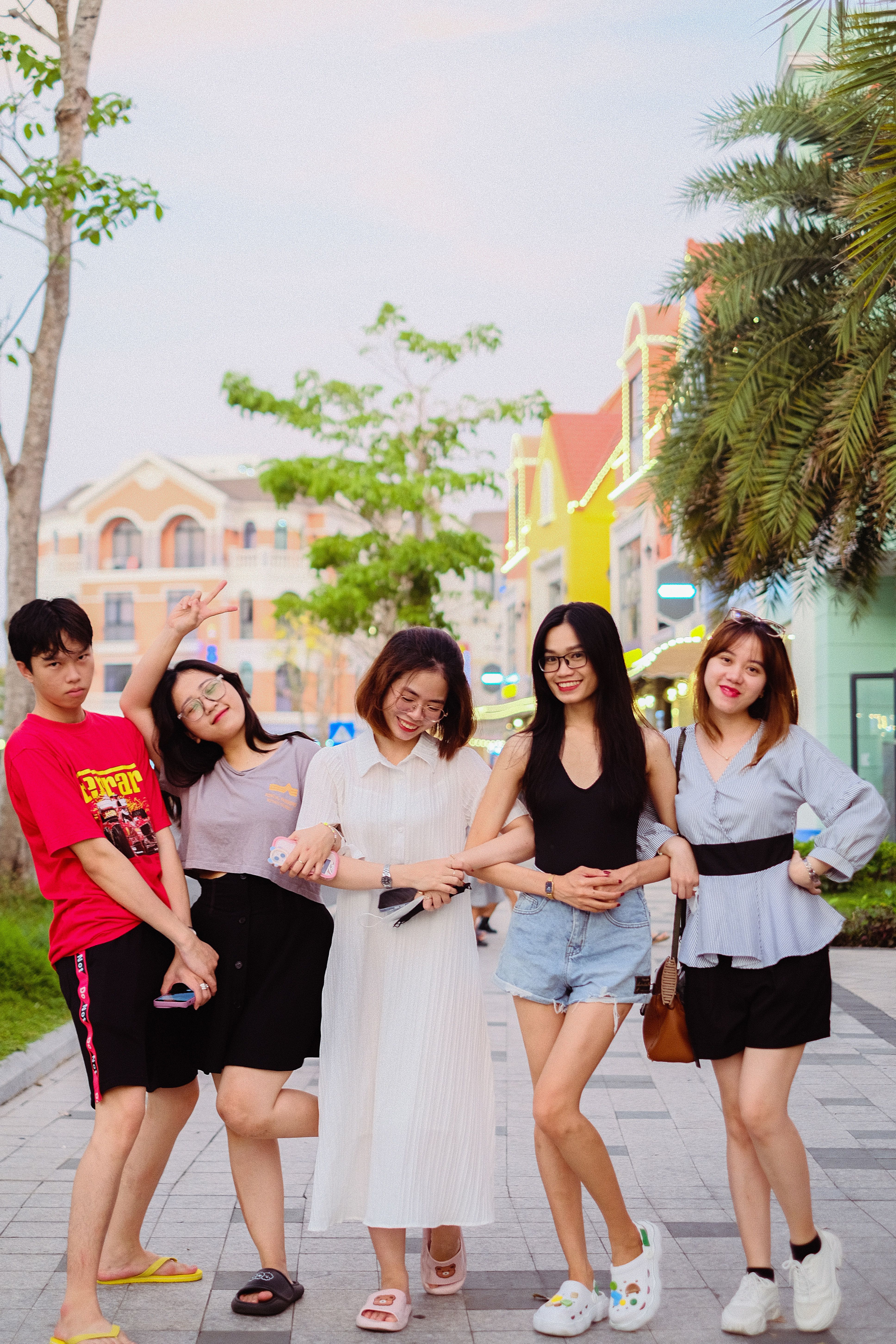 A Group of Friends on a Sidewalk in City · Free Stock Photo