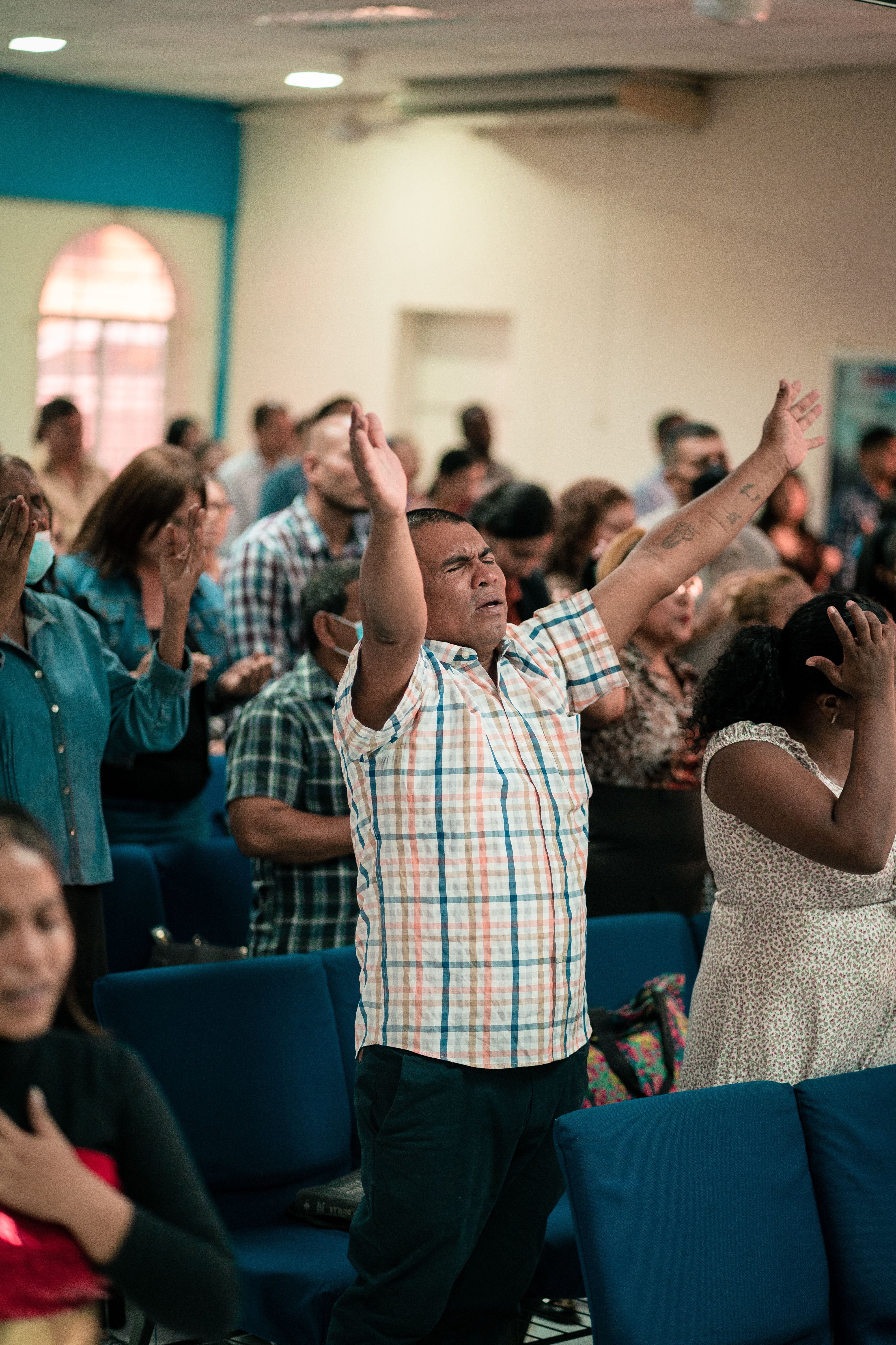Diverse Group Engaged in Community Gathering · Free Stock Photo