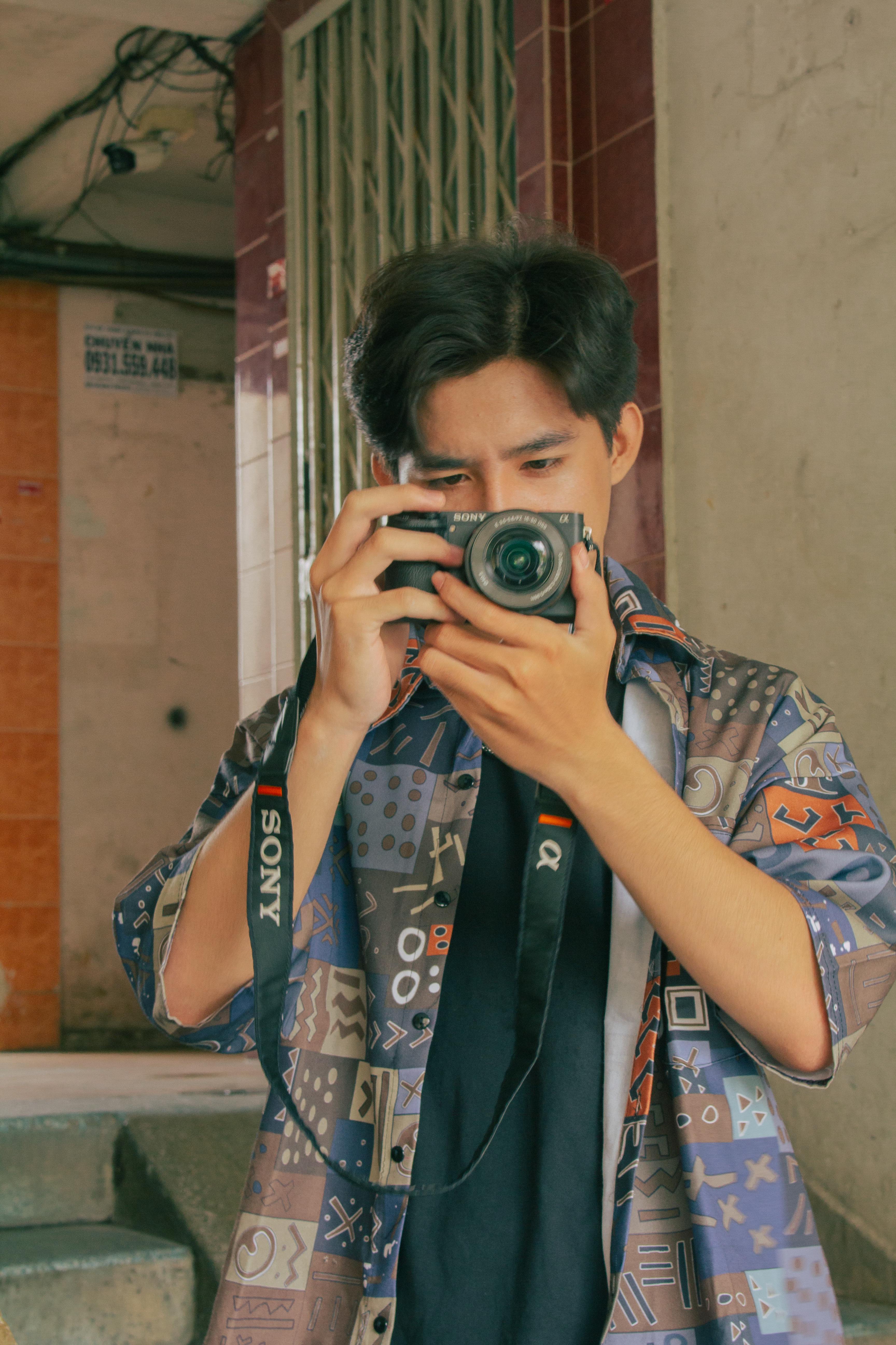 Man Taking a Photo with Sony Camera · Free Stock Photo