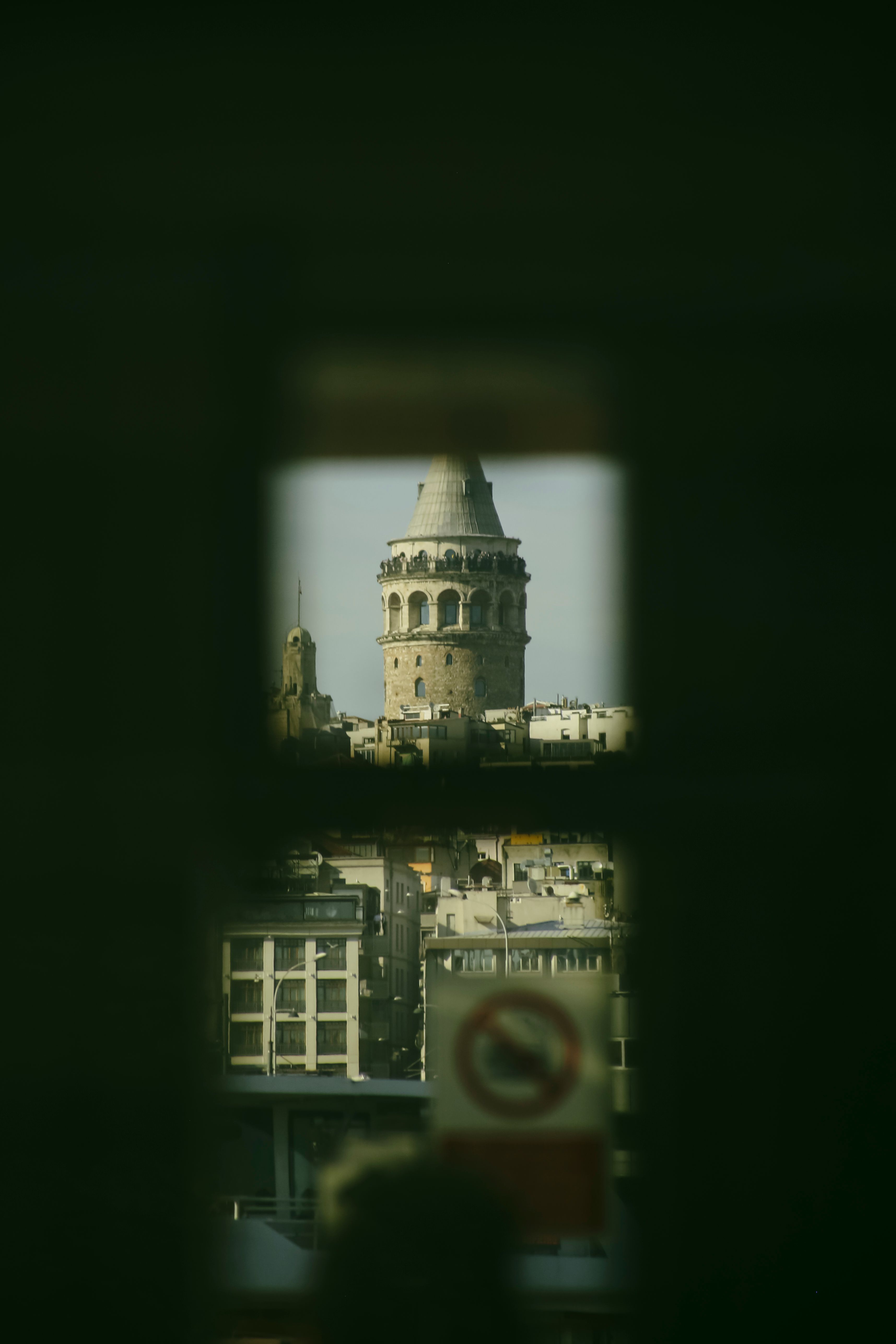 A Tower Behind a Window · Free Stock Photo