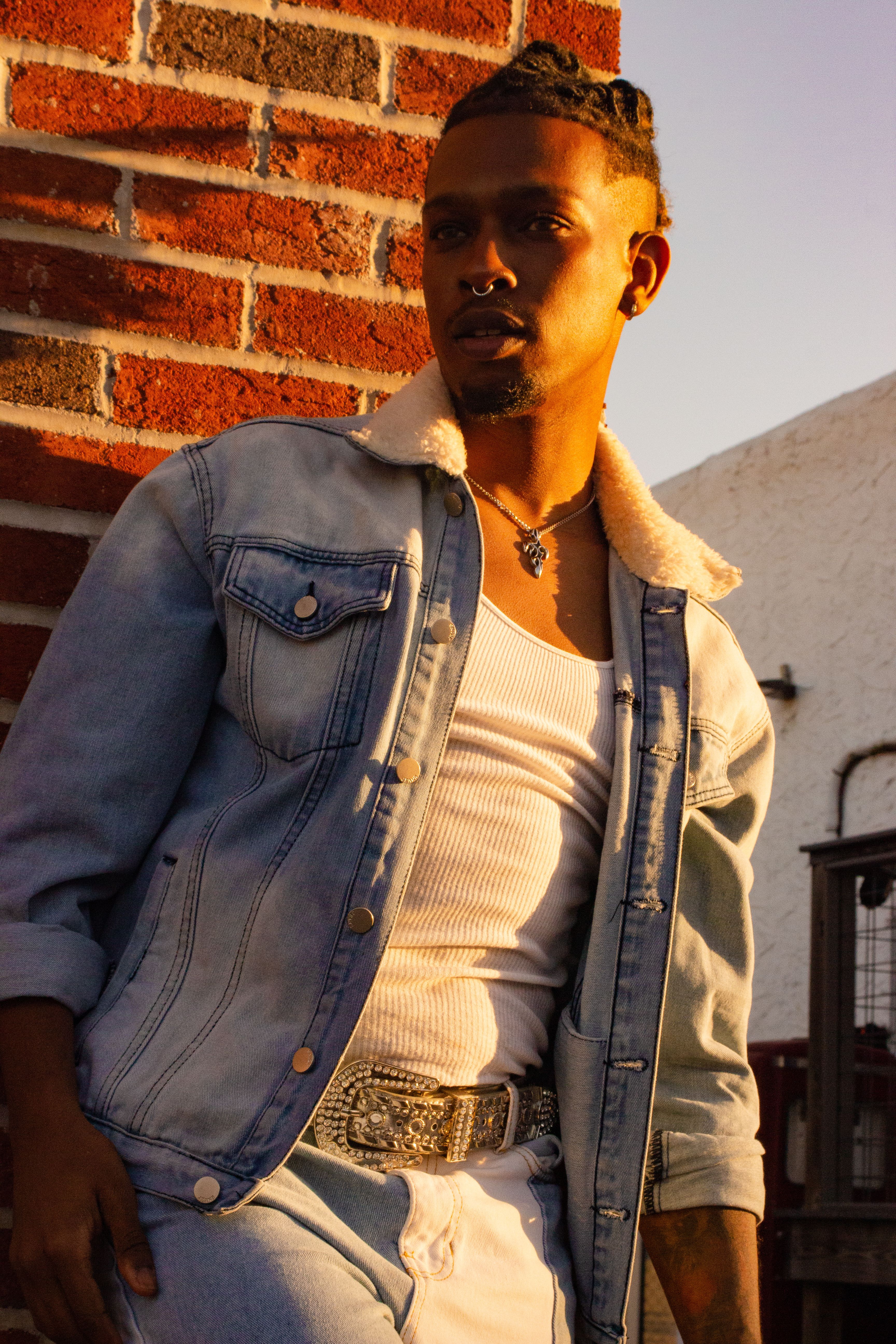 Man Posing in Denim Jacket · Free Stock Photo