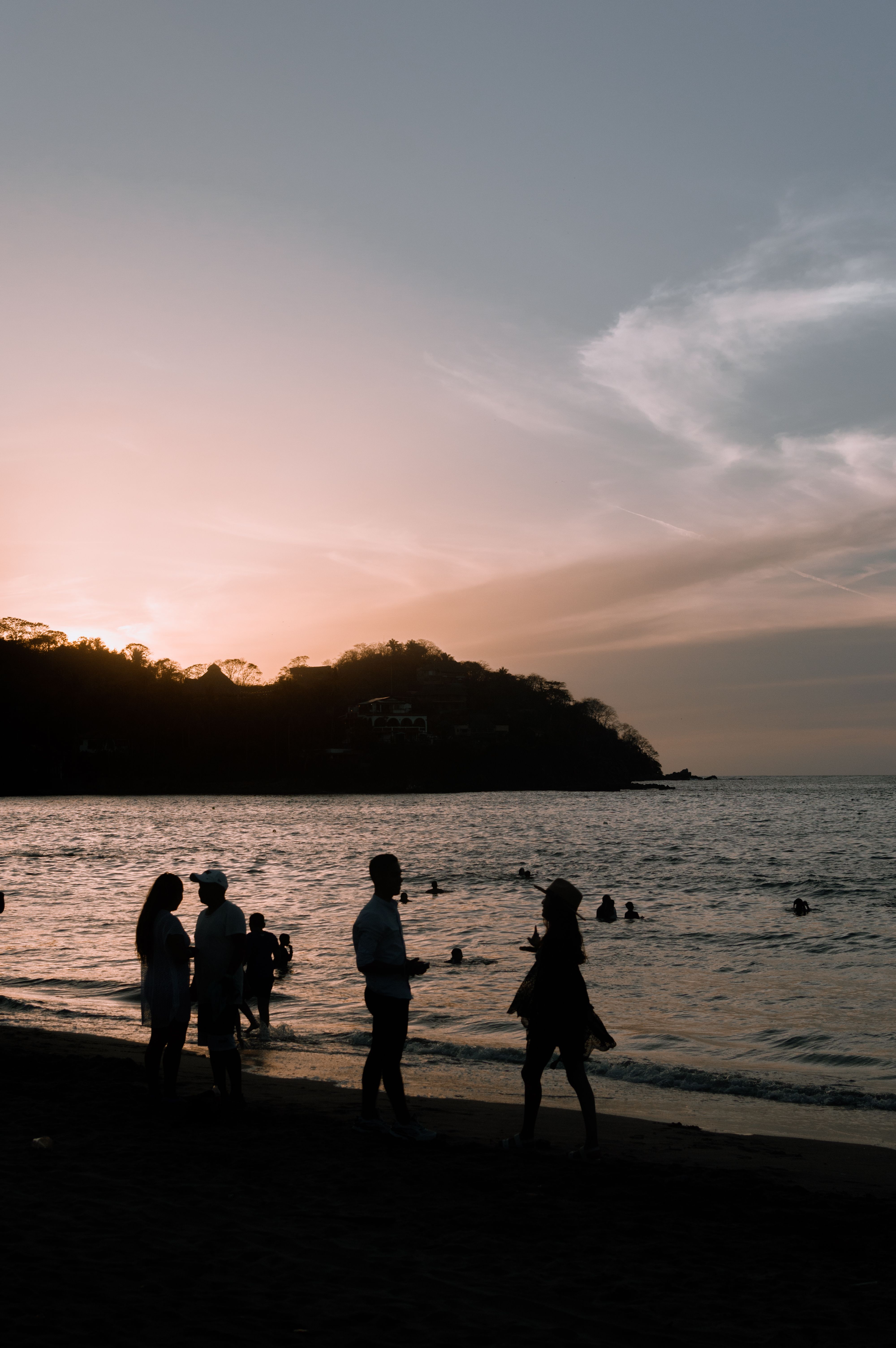 Wave and People on Sea Shore · Free Stock Photo