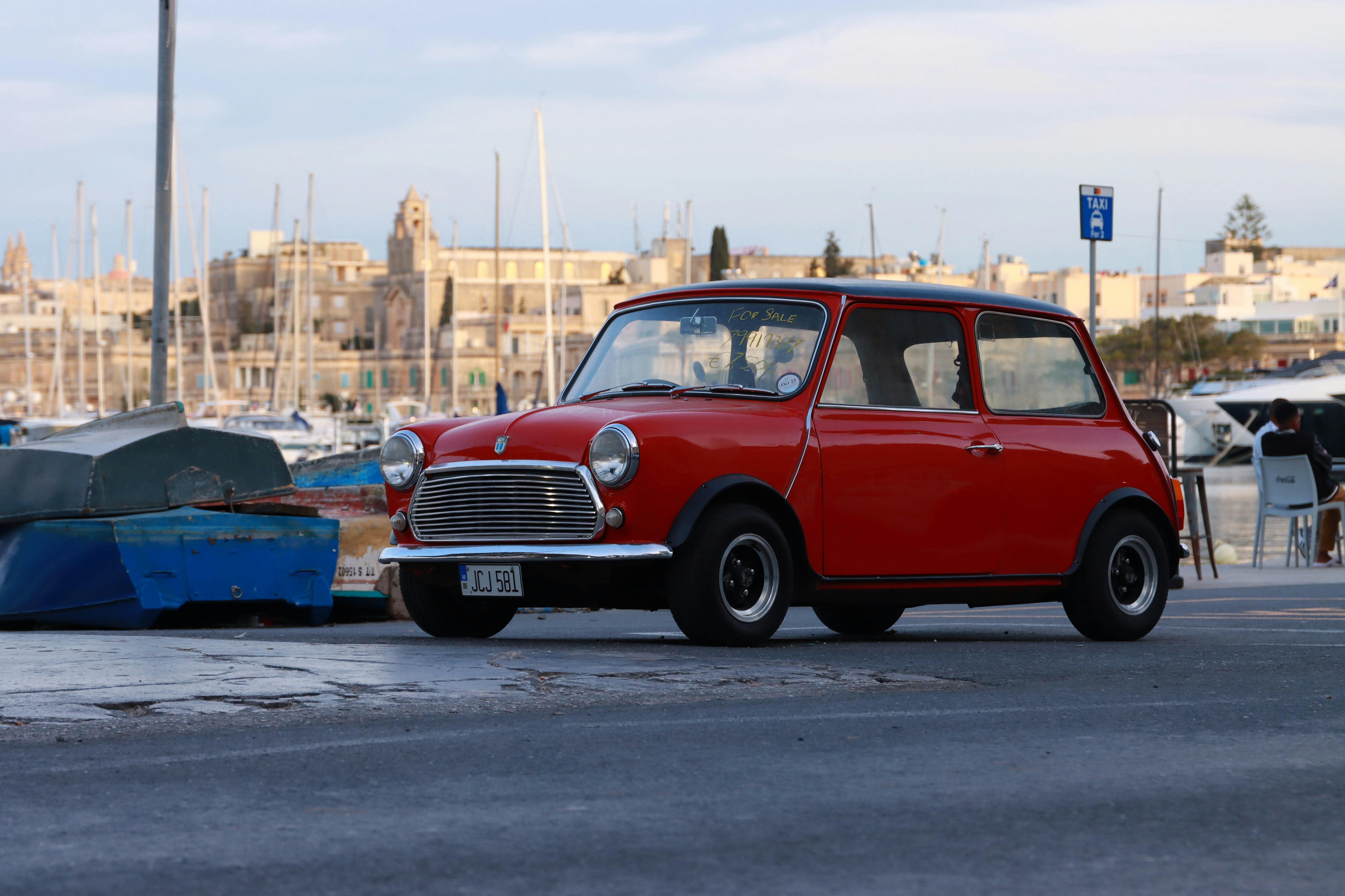 Red Old-fashioned Mini in Street · Free Stock Photo