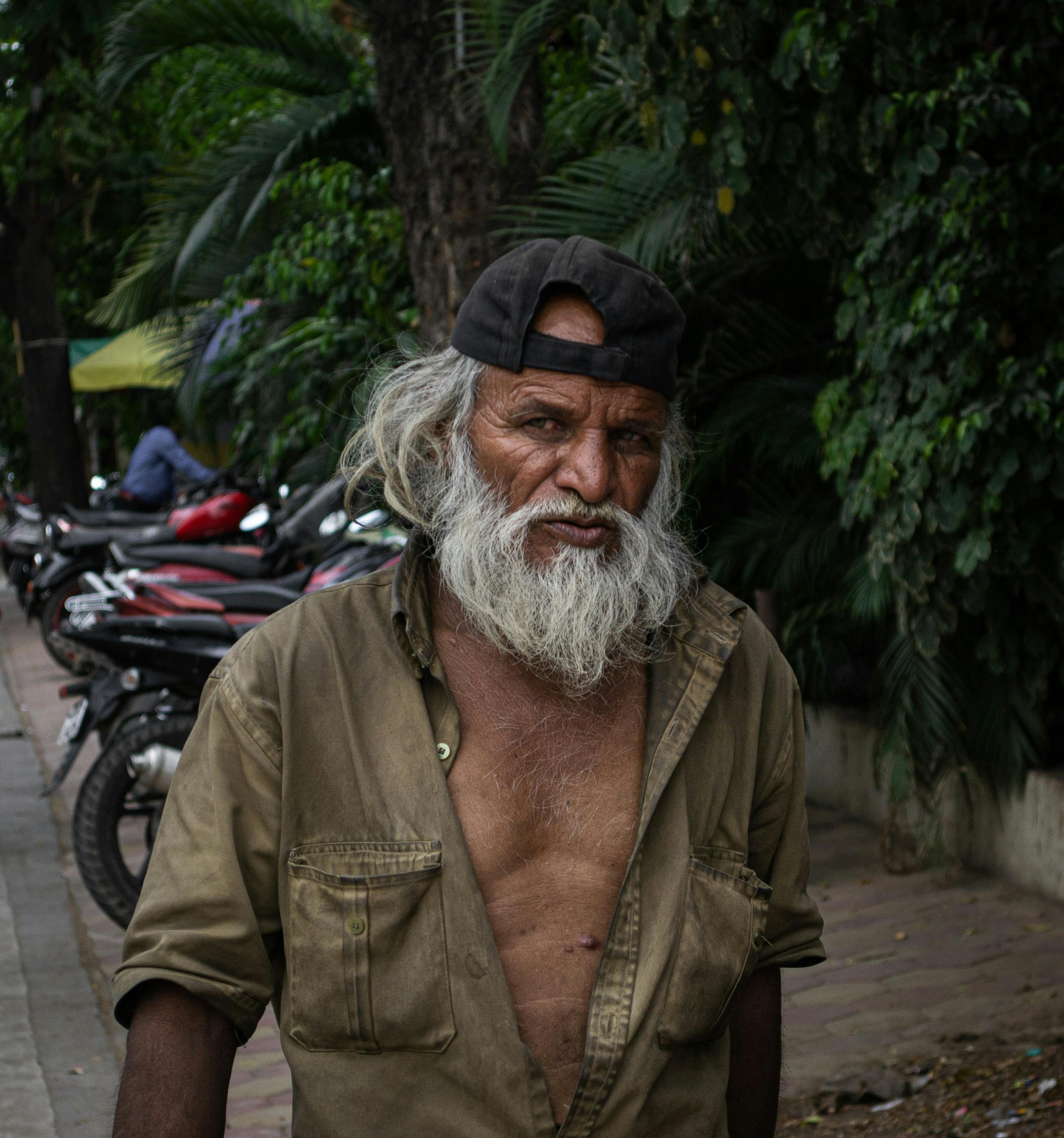 Portrait of Man in Yellow Jacket · Free Stock Photo