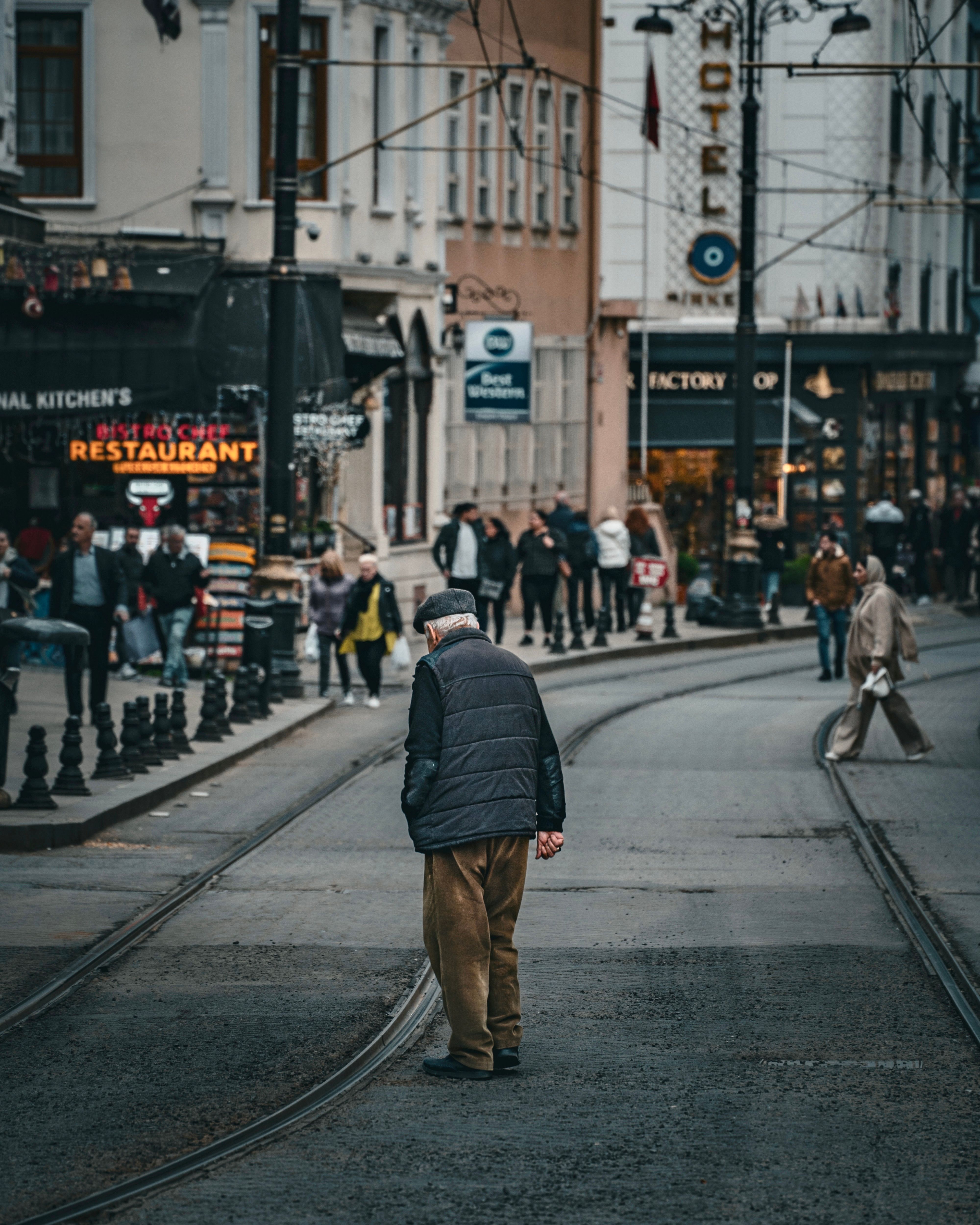 Man Standing on City Street · Free Stock Photo