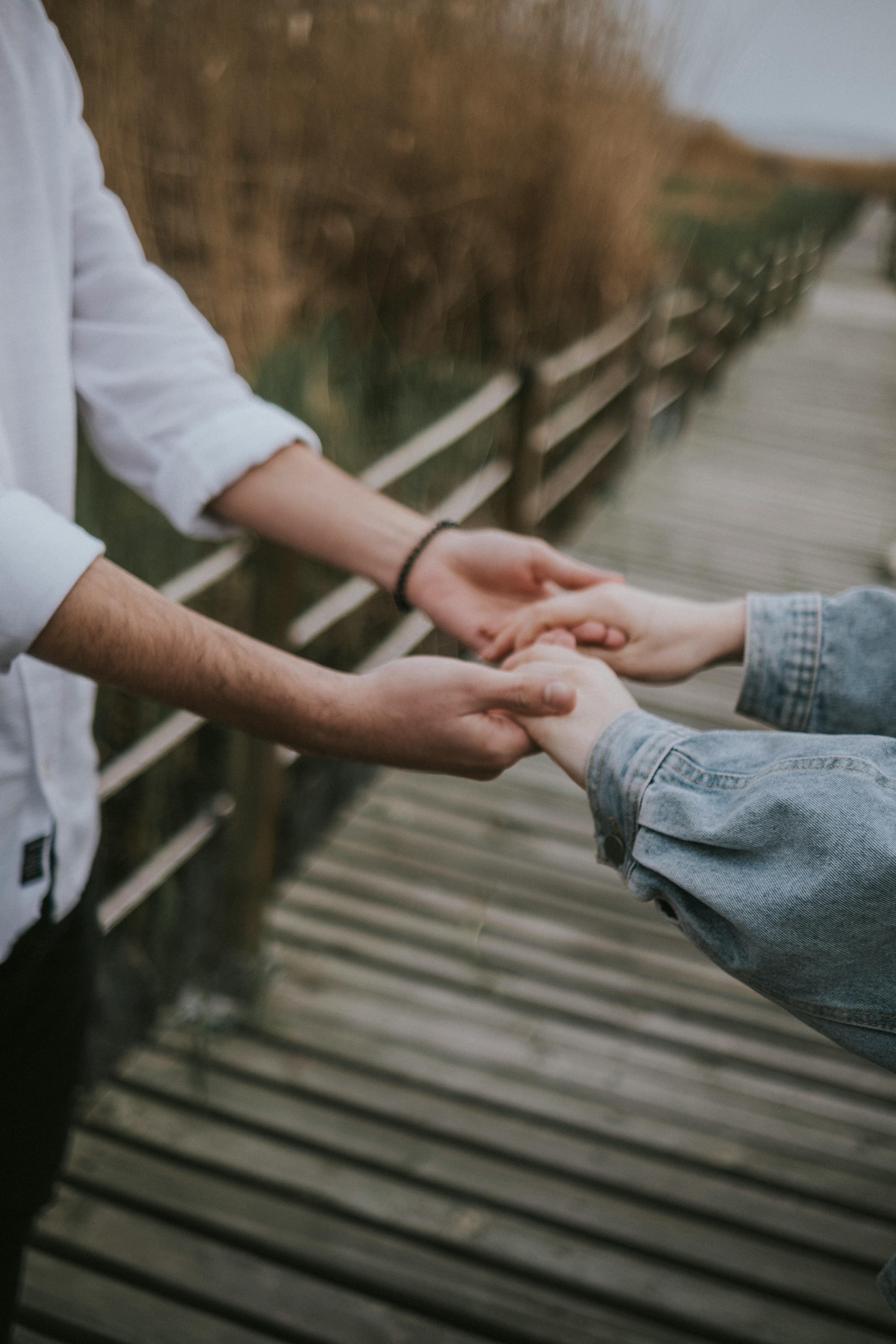 Close up of Couple Hands Together · Free Stock Photo