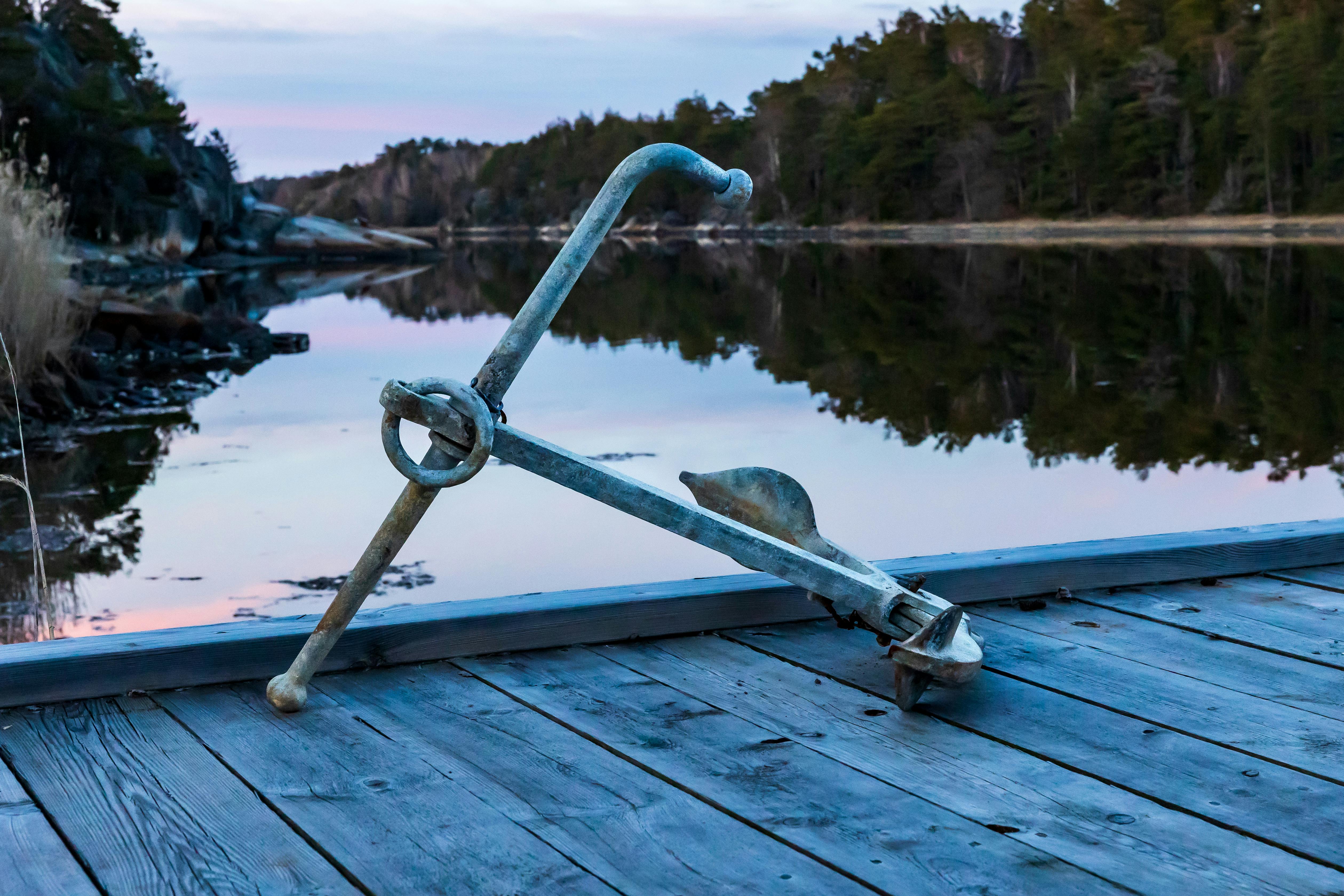 Old Anchor on Bridge near Lake at Sunset · Free Stock Photo