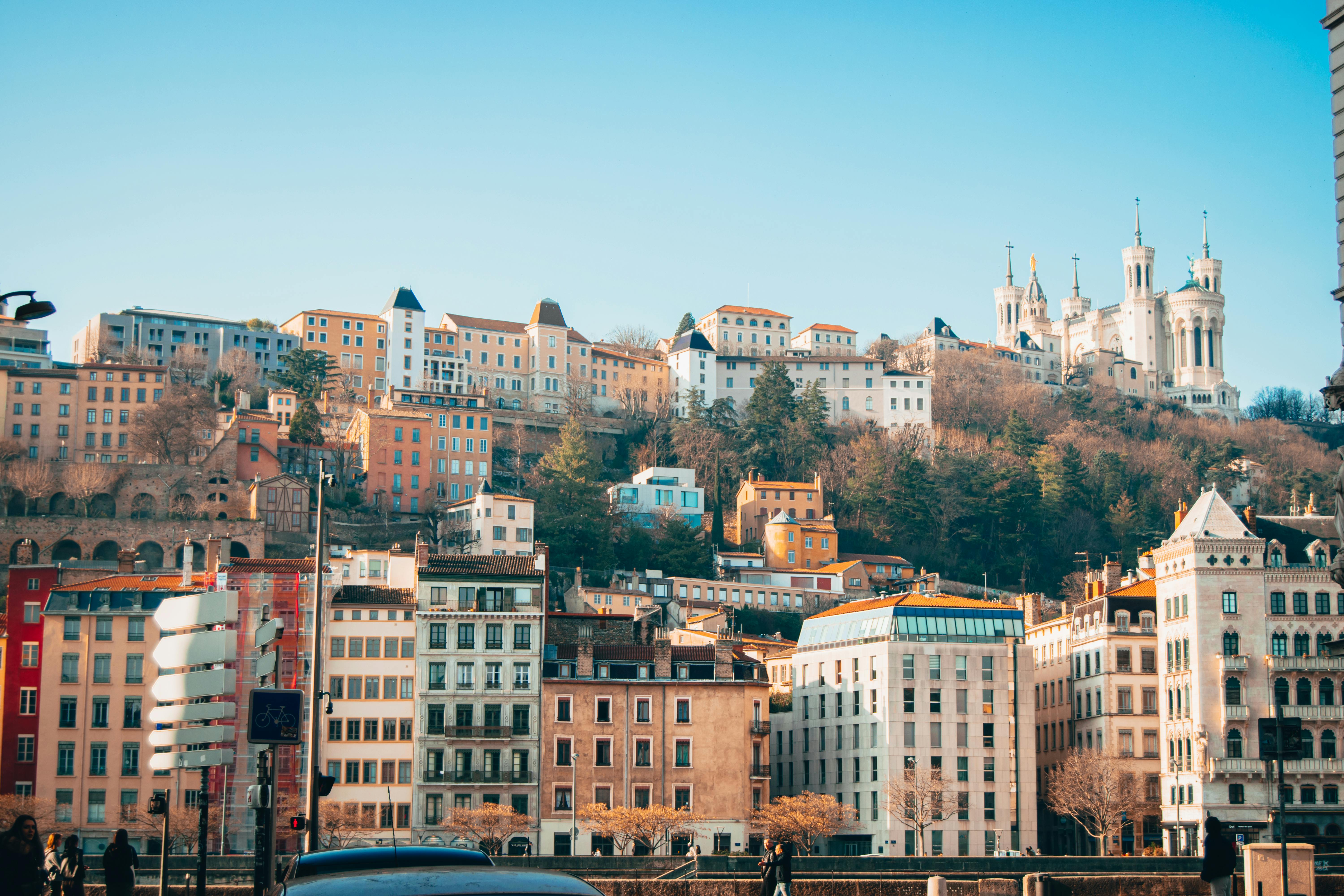 Clear Sky over Buildings on Hill in City · Free Stock Photo